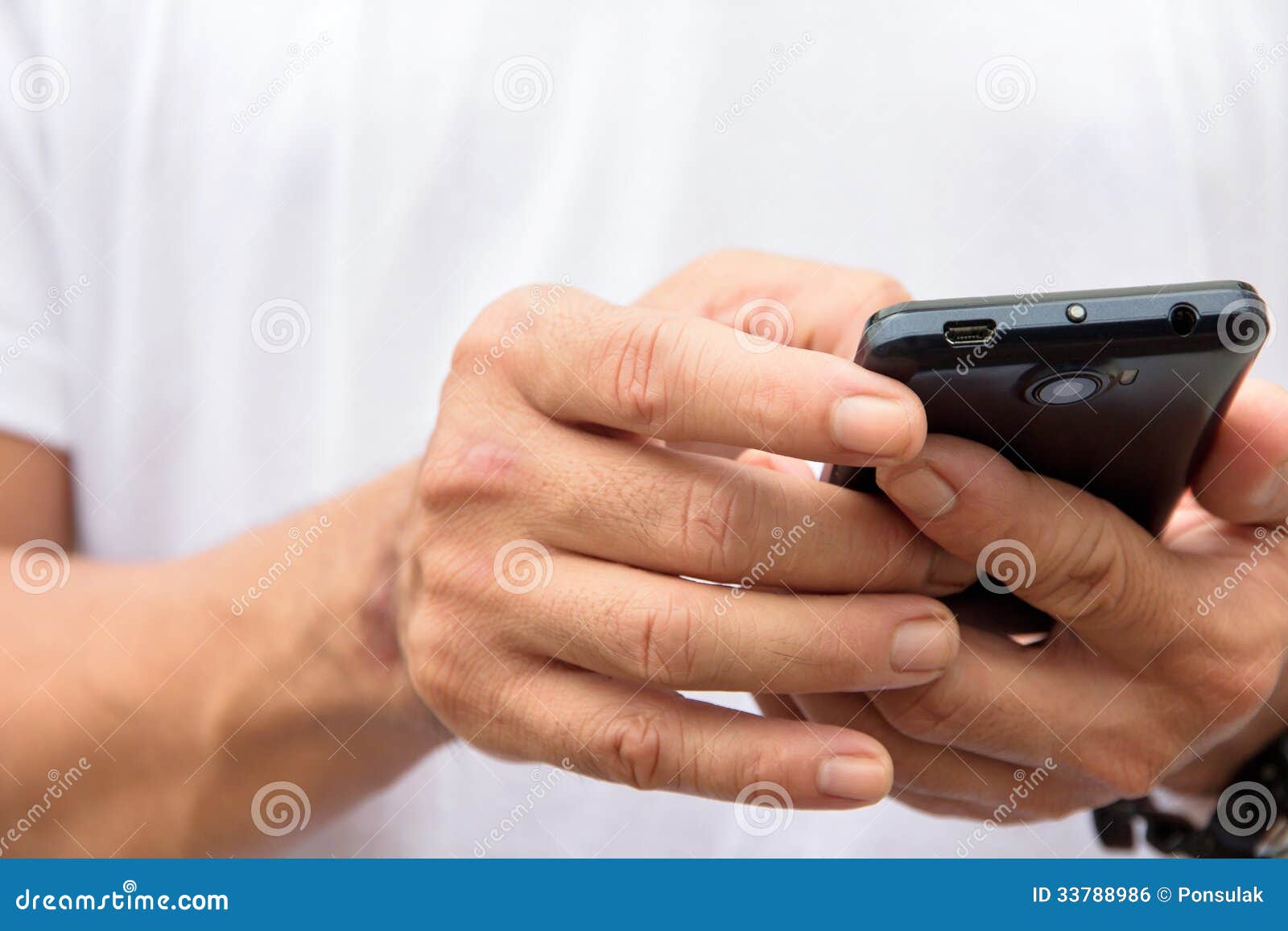 Man checking his phone stock photo. Image of culture - 33788986