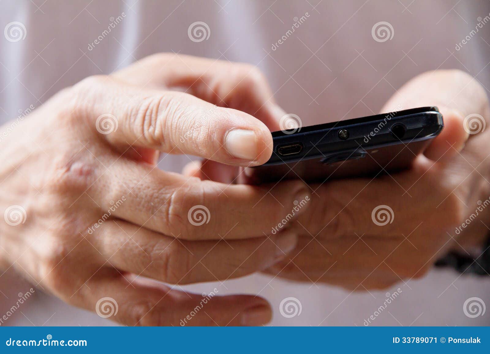 Man checking his phone stock image. Image of cell, mobile - 33789071