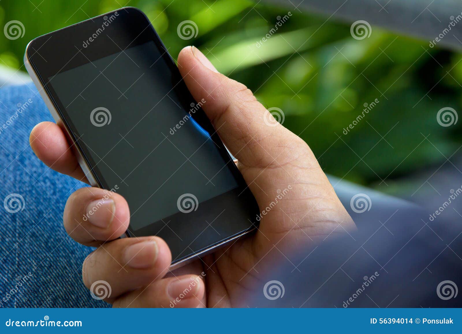 Man checking his phone stock photo. Image of technology - 56394014