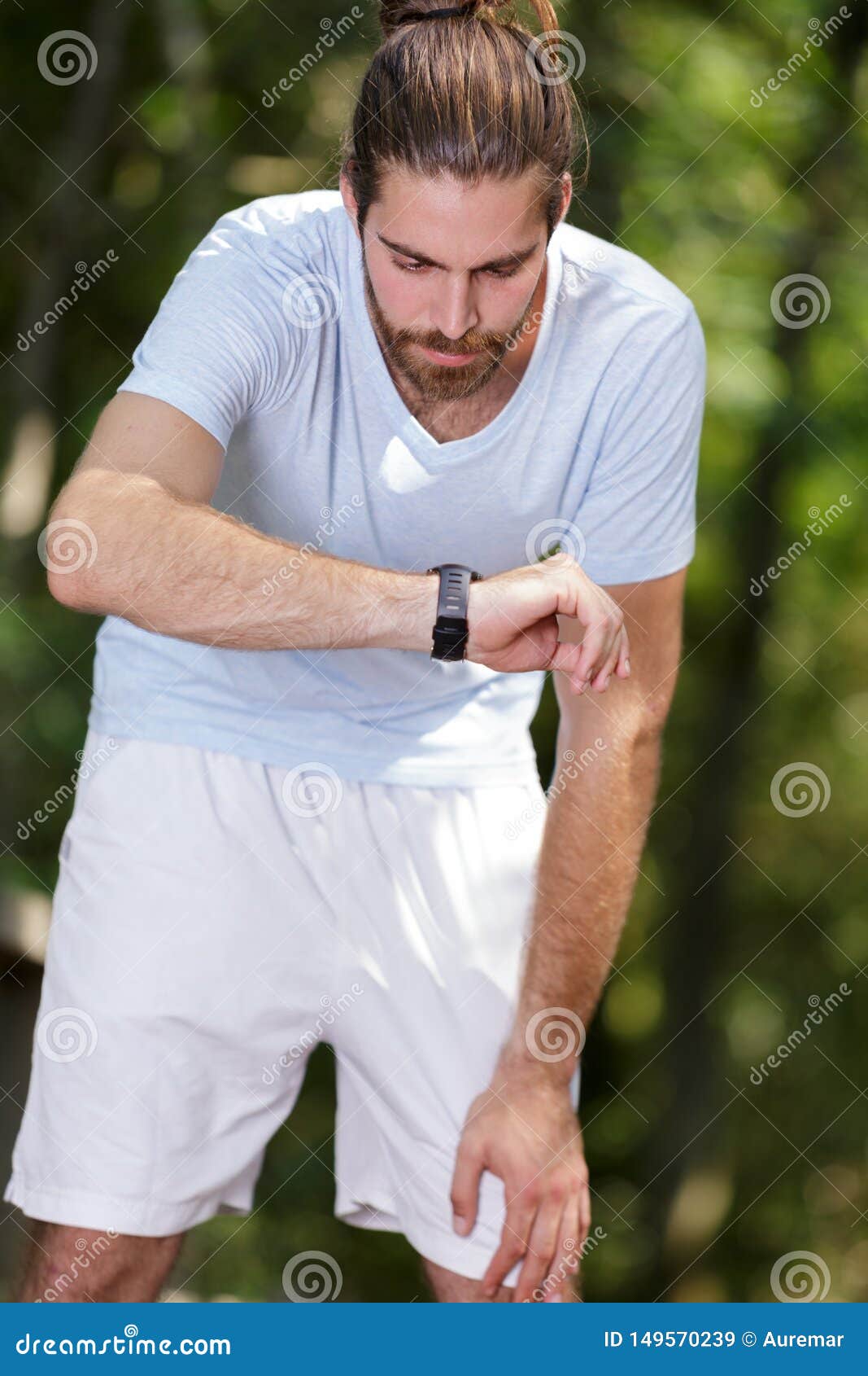 Man checking his stopwatch stock image. Image of limit - 149570239