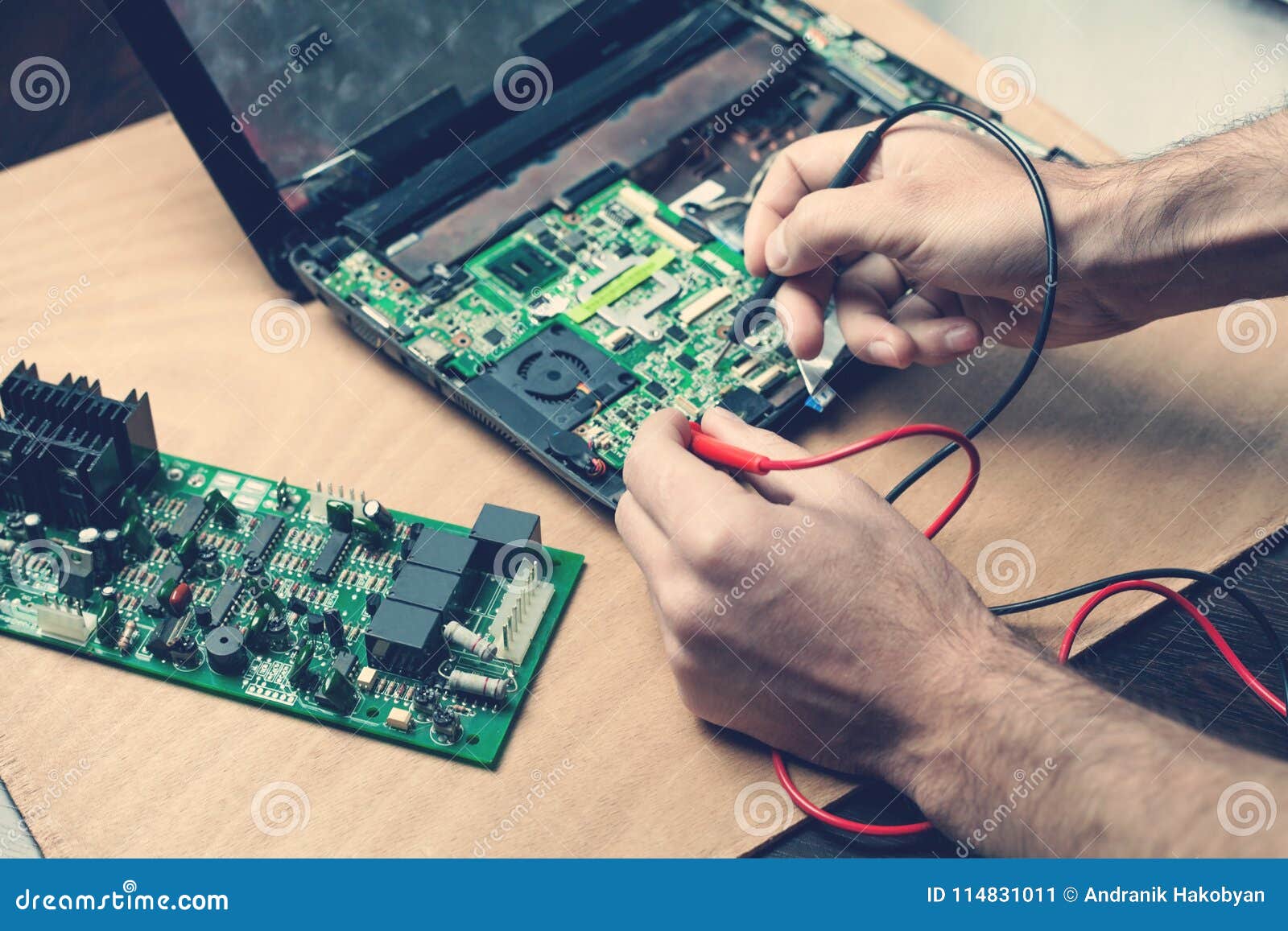 Man Checking Laptop with Multimeter. Stock Image - Image of broken ...