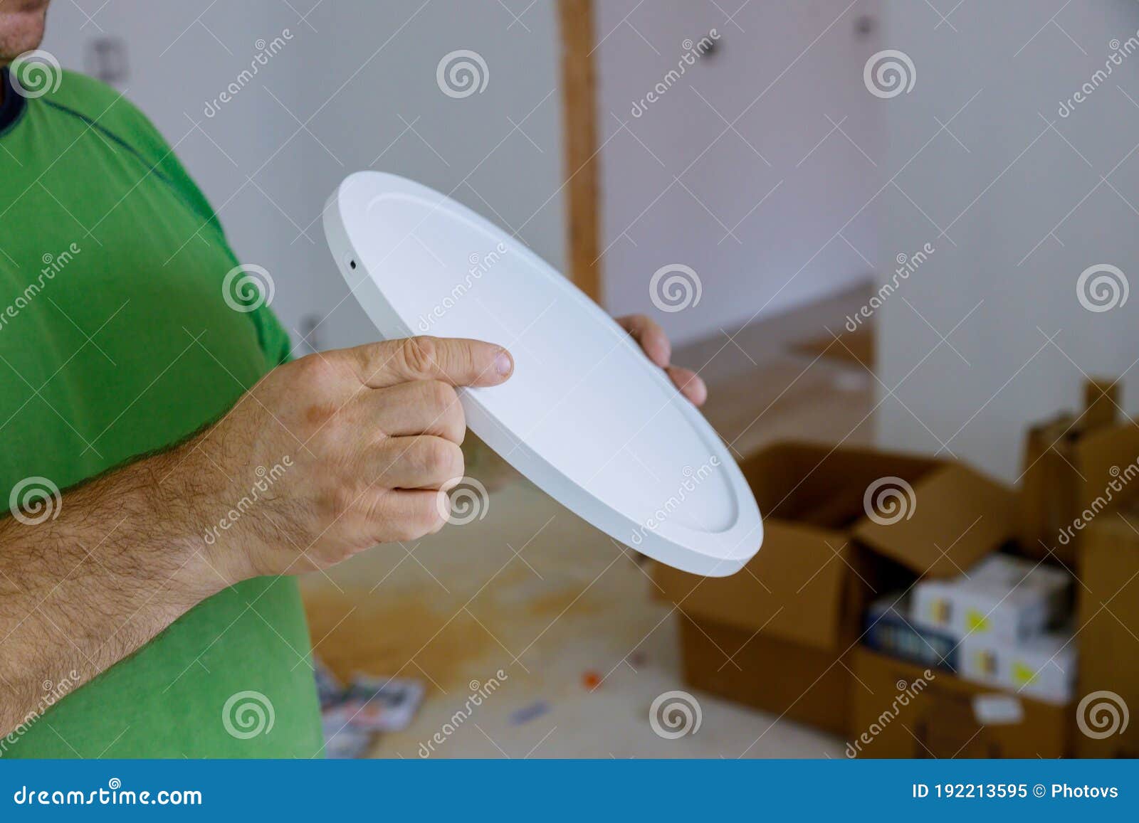 Man Checking LED before Installation Lamp on the Ceiling Maintenance ...