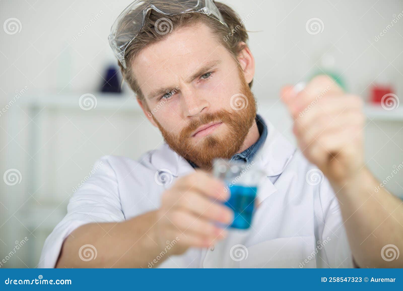 Man Checking Liquids in Lab Stock Image - Image of group, computer ... Man Checking Liquids in Lab Stock Image - Image of group, computer ...