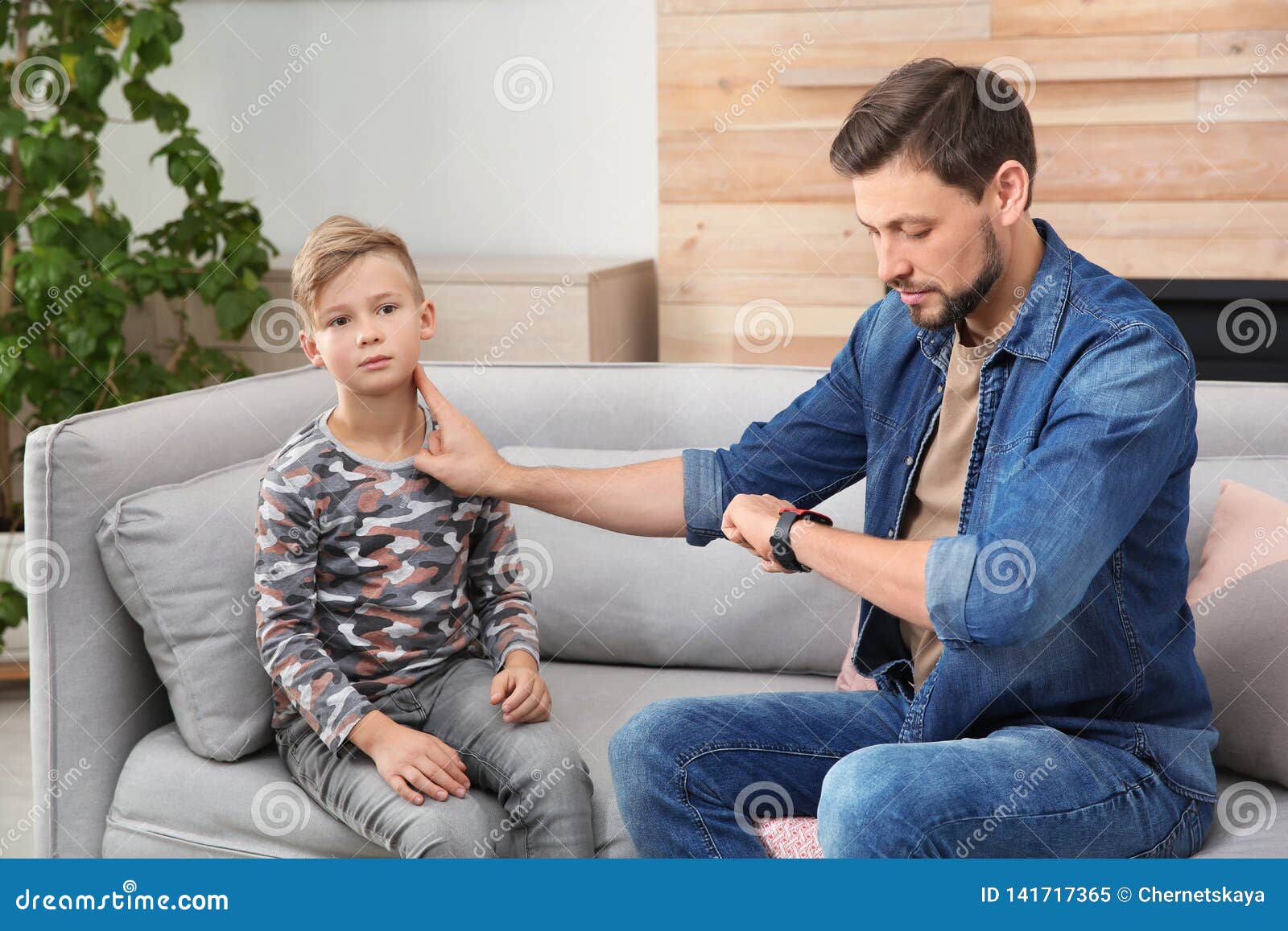 Man Checking Little Boy`s Pulse with Fingers Stock Image - Image of ...