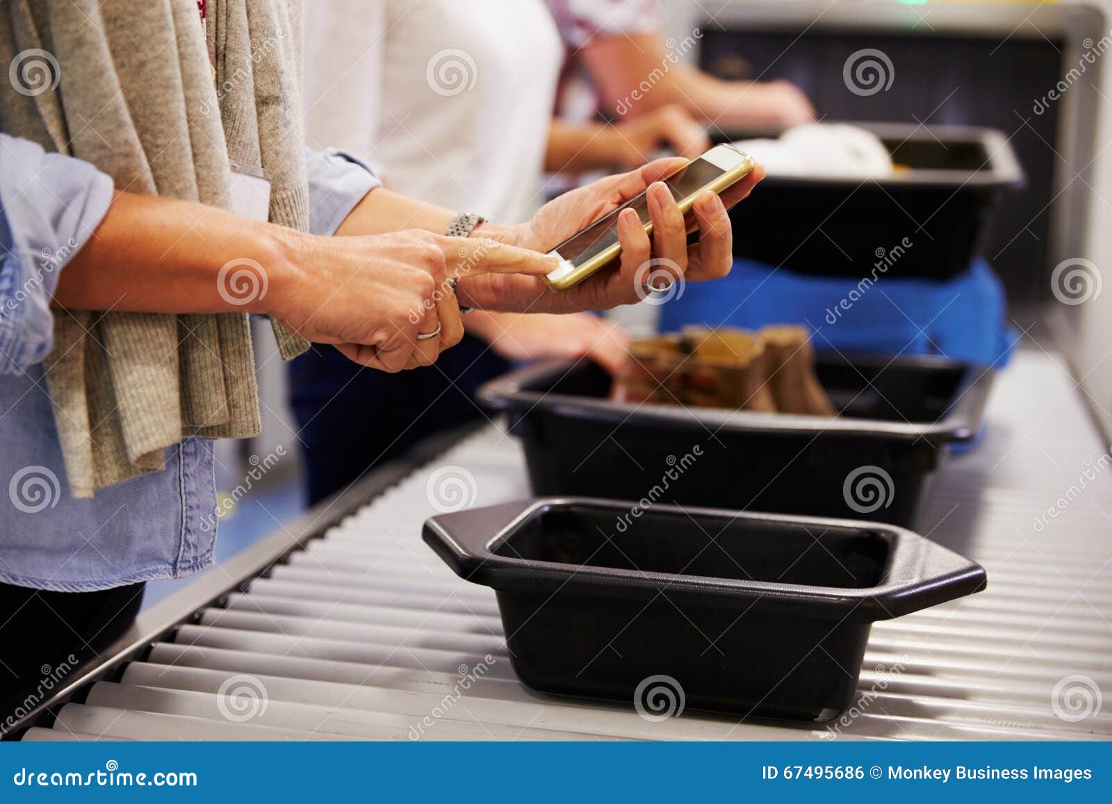Man Checking Mobile is Charged at Airport Security Check Stock Photo ...