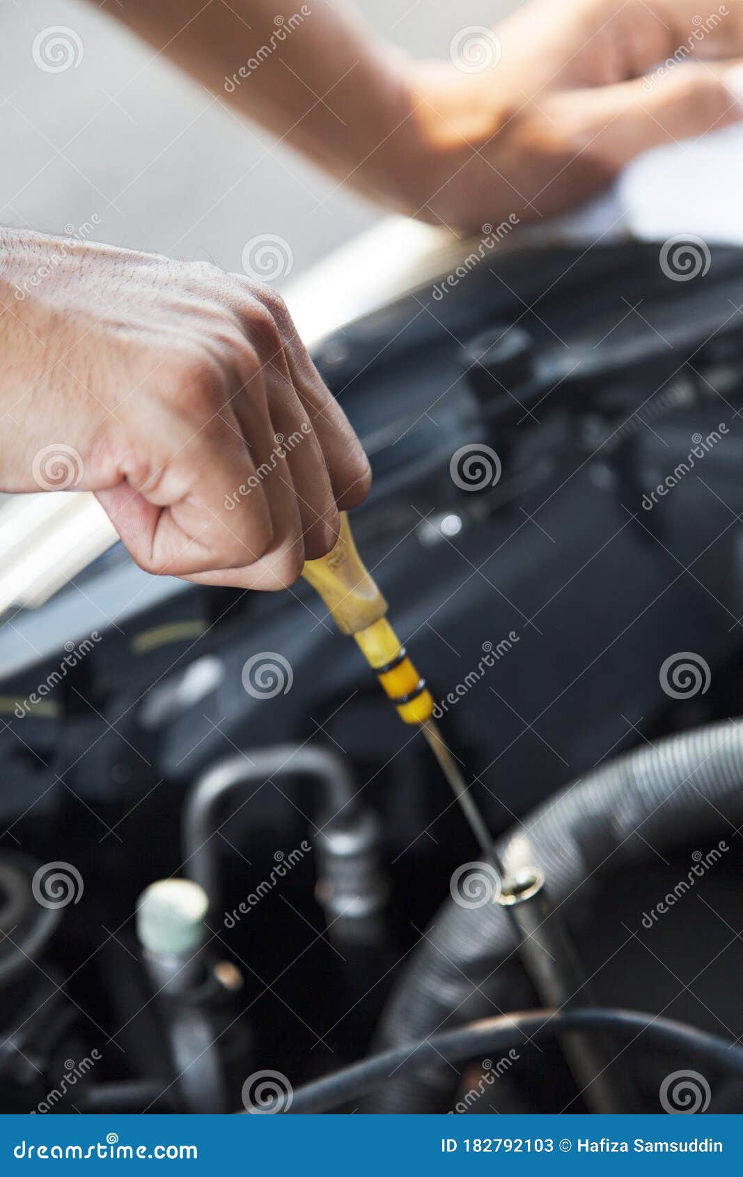 Checking Motor Oil Level In The Car. New Engine Lubricant. Stock ...