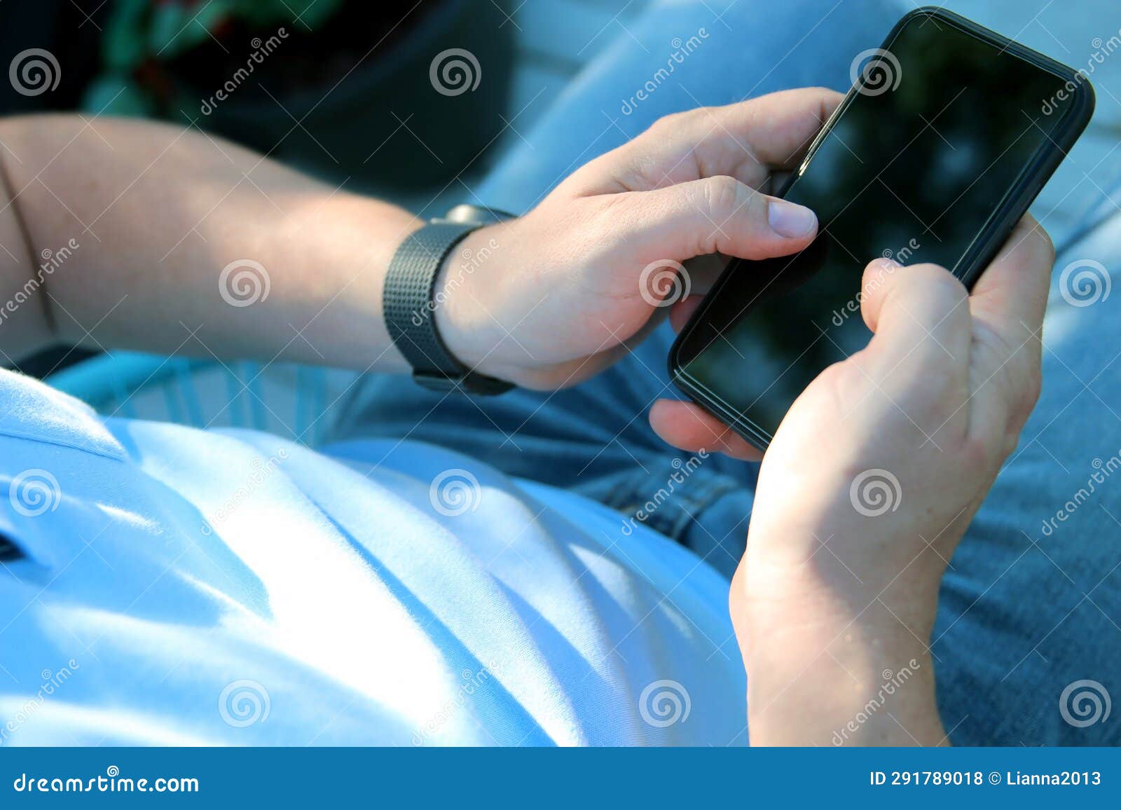 Man is Checking Something on His Smartphone Outside Stock Photo - Image ...