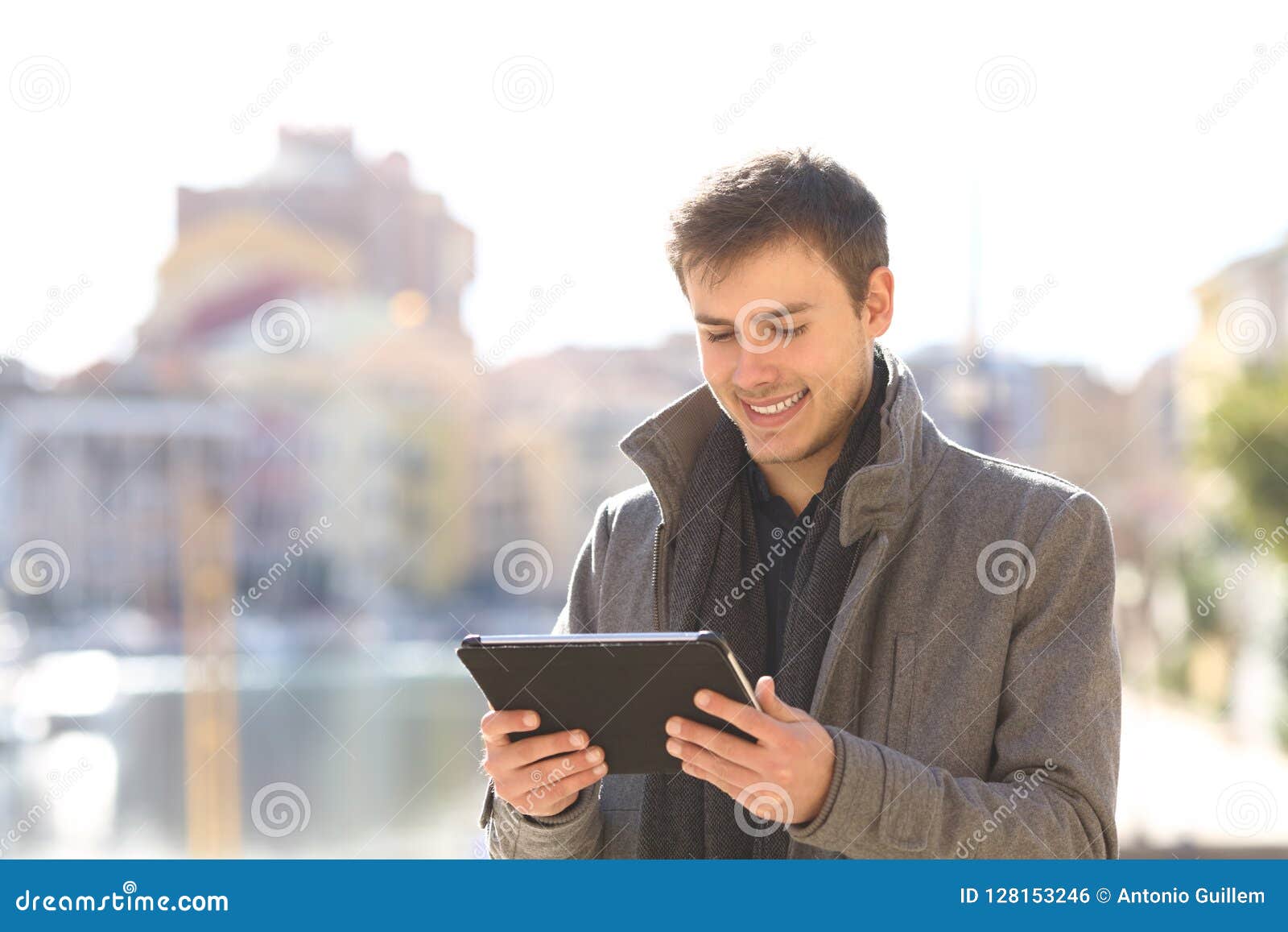 Man Checking a Tablet in Winter Stock Photo - Image of lifestyle ...