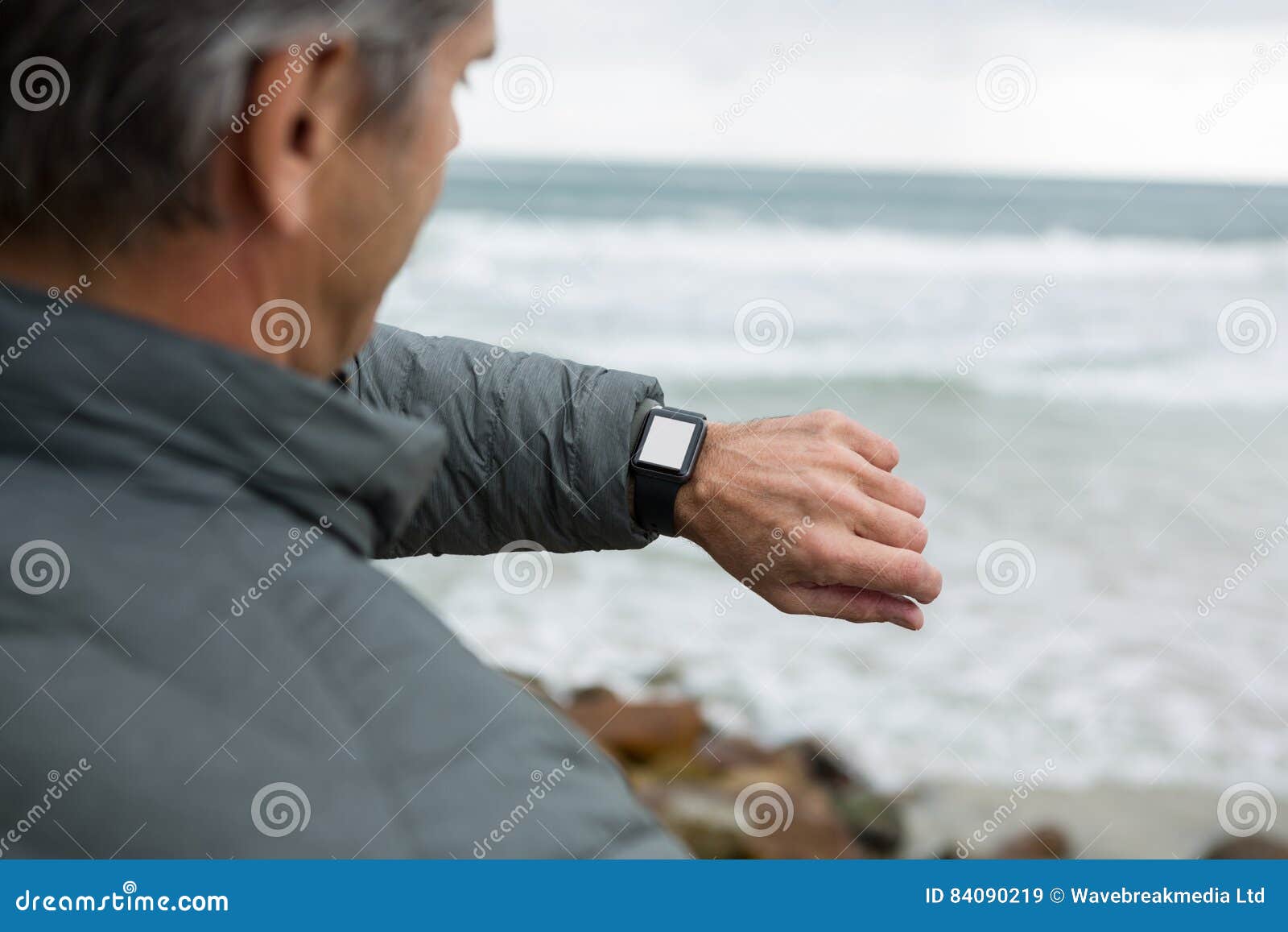 Man Checking the Time on Smartwatch Stock Image - Image of male, adult ...