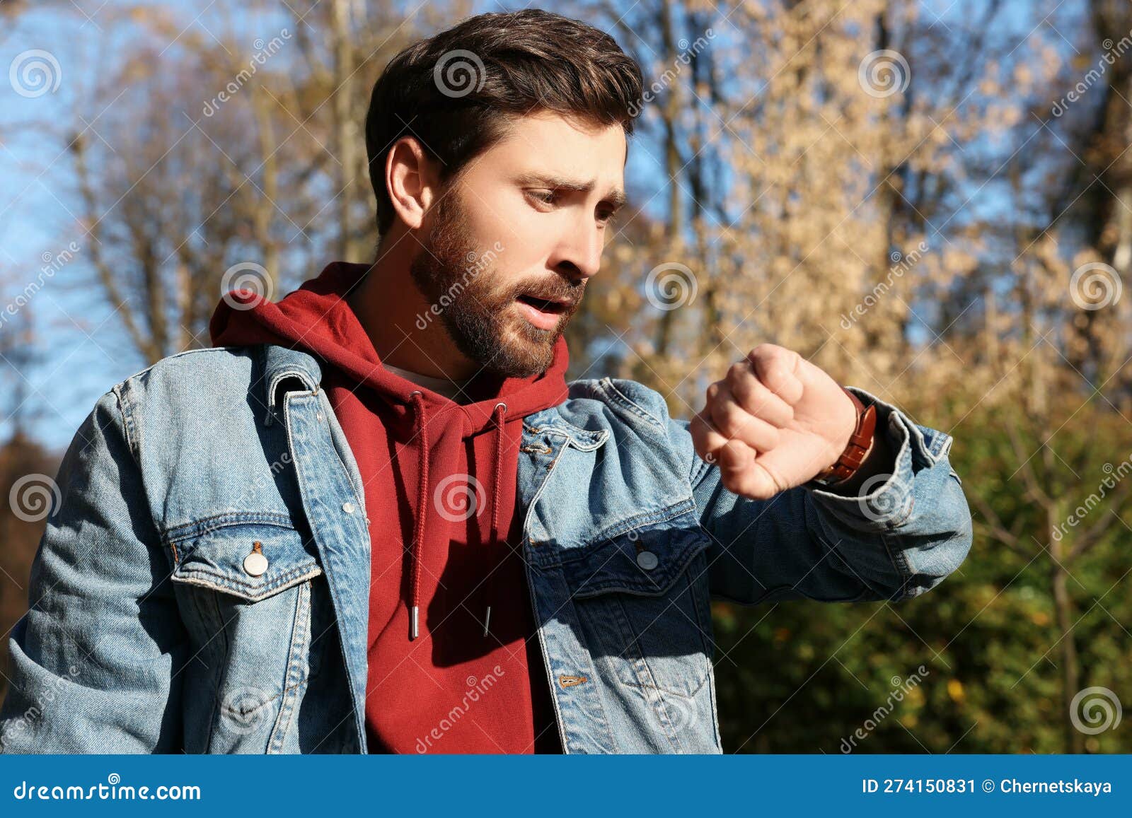 Man Checking Time on Watch Outdoors. Being Late Concept Stock Image ...
