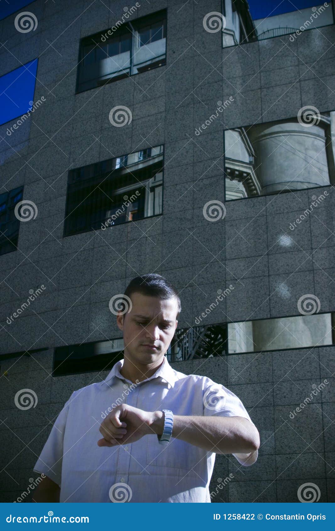Man checking watch stock photo. Image of corporate, handsome - 1258422