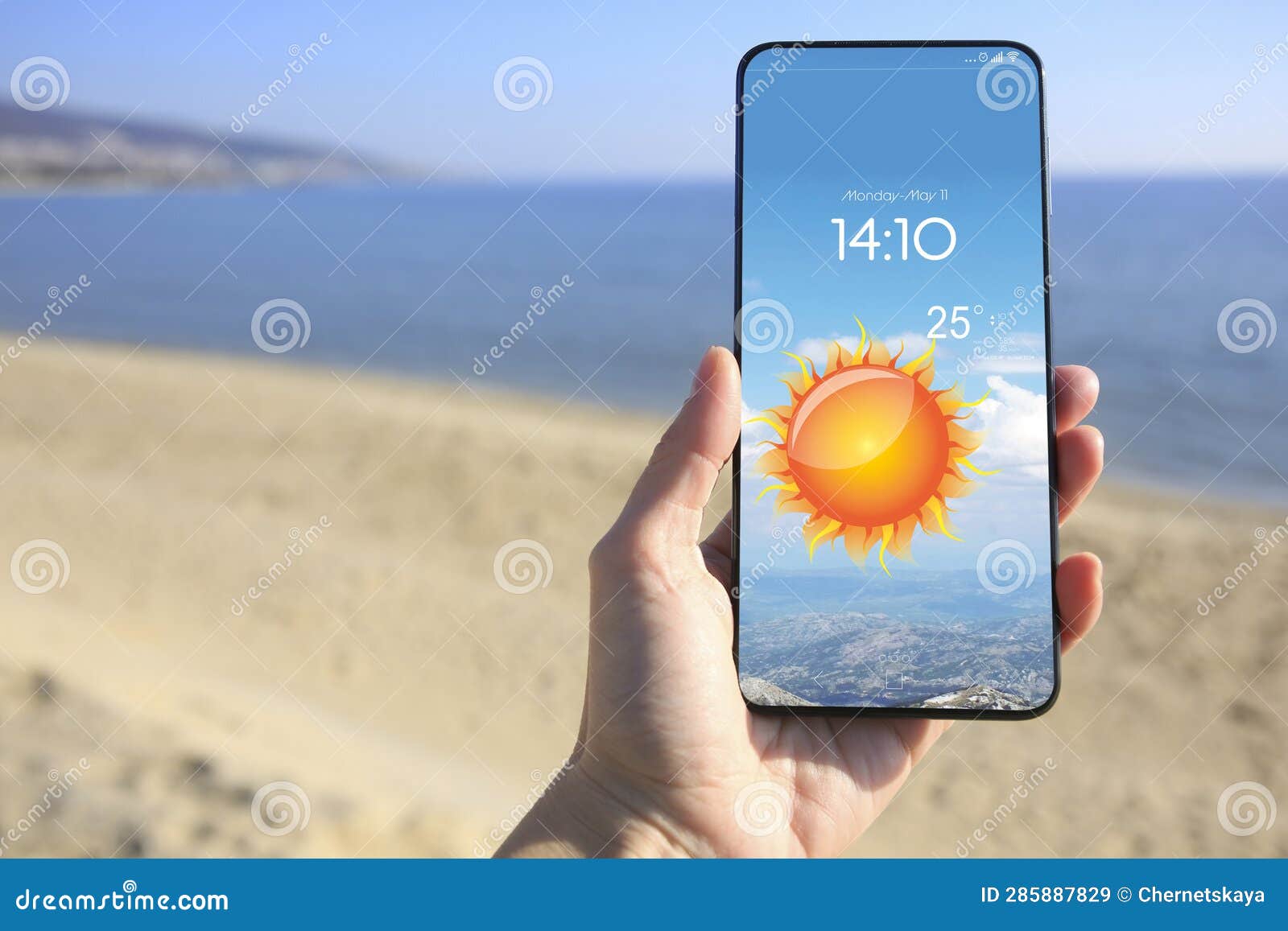 Man Checking Weather Using App on Smartphone on Beach, Closeup. Data ...
