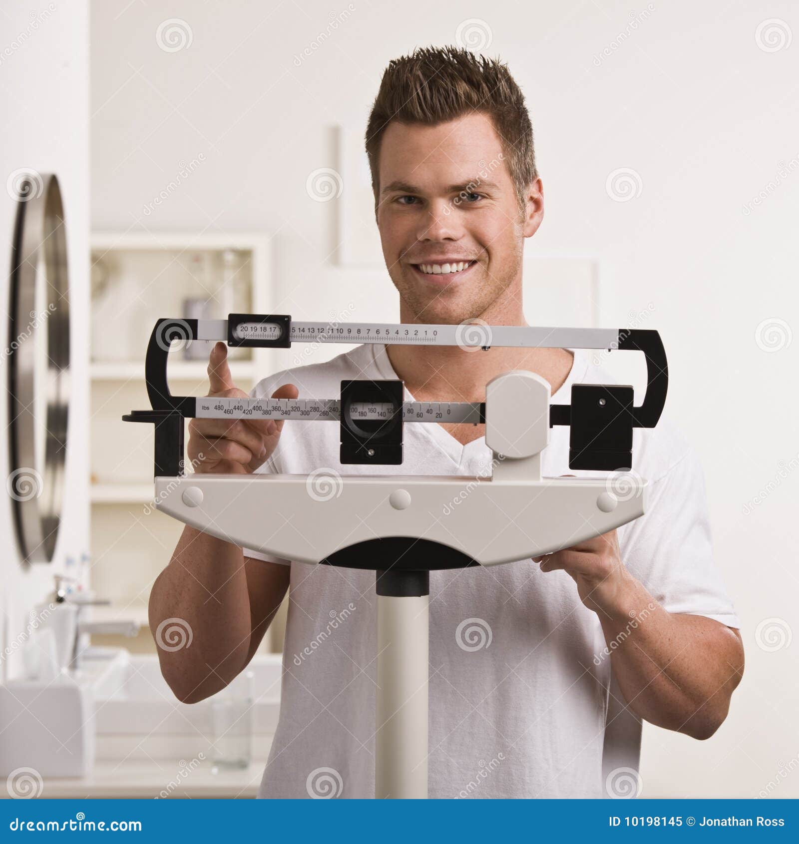 Man Checking Weight stock image. Image of weight, stand - 10198145