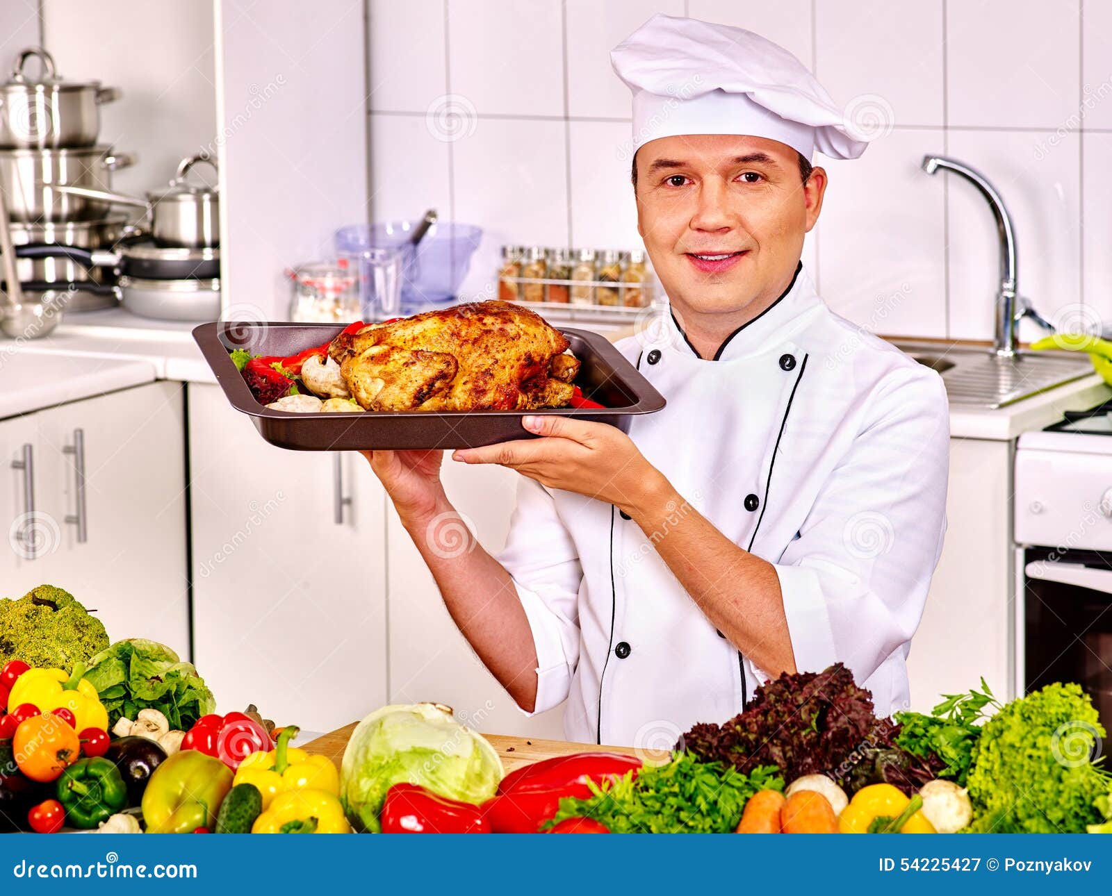 Man in Chef Hat Cooking Chicken Stock Image - Image of kitchen, cooking ...