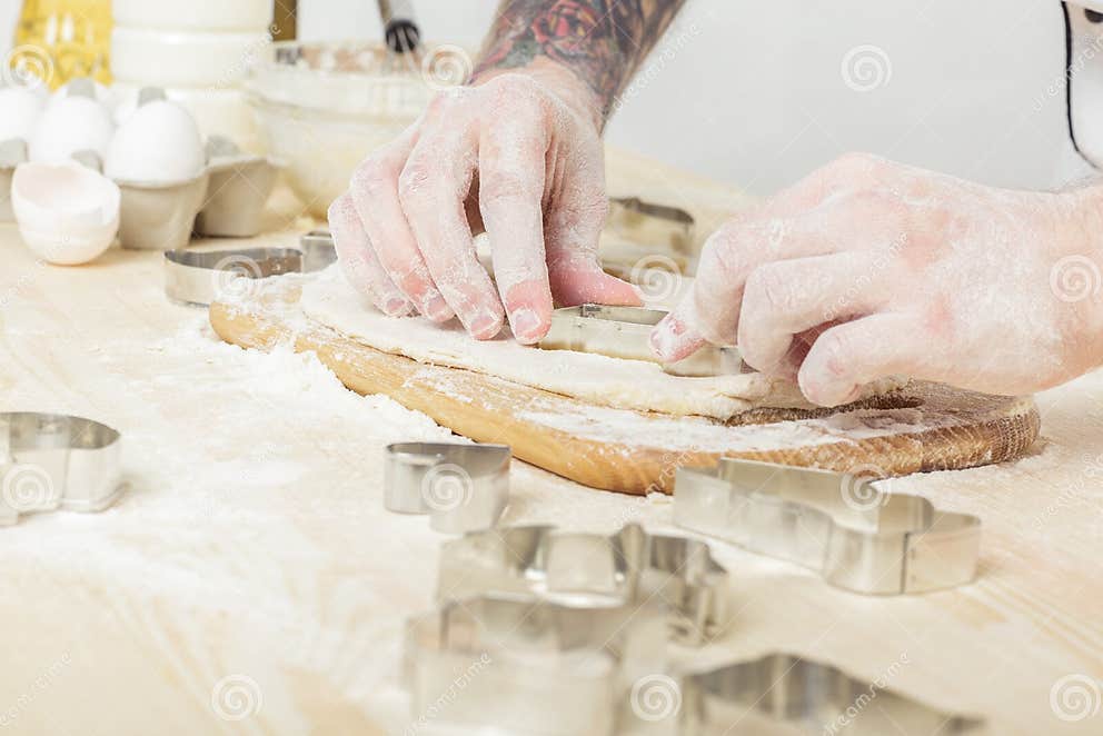 Man Chef in Uniform Makes Cookies with Baking Forms Stock Photo - Image ...