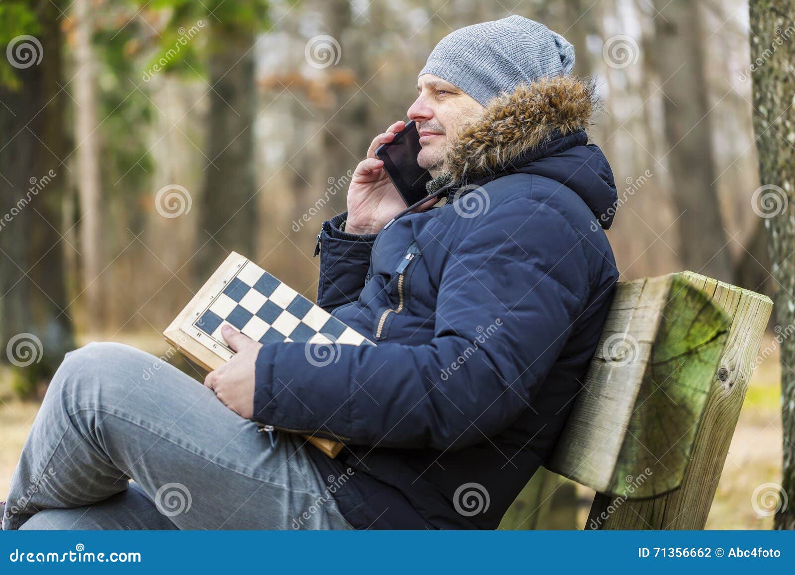Man Chess Talking Smart Phone Park Stock Photos - Free & Royalty-Free ...