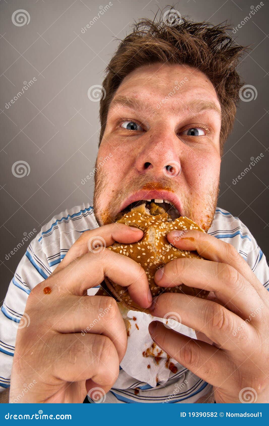 Man chewing hamburger stock photo. Image of hideous, diner - 19390582