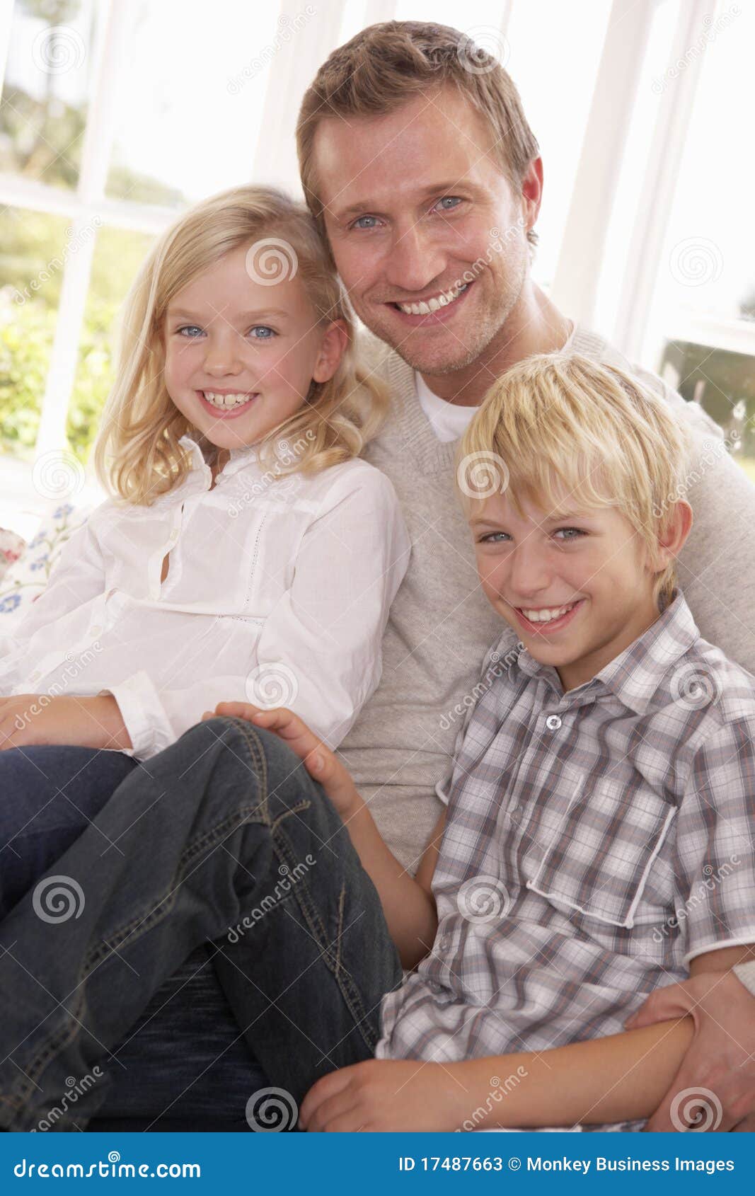 Man and Children Pose Together Stock Image - Image of sitting, posing ...
