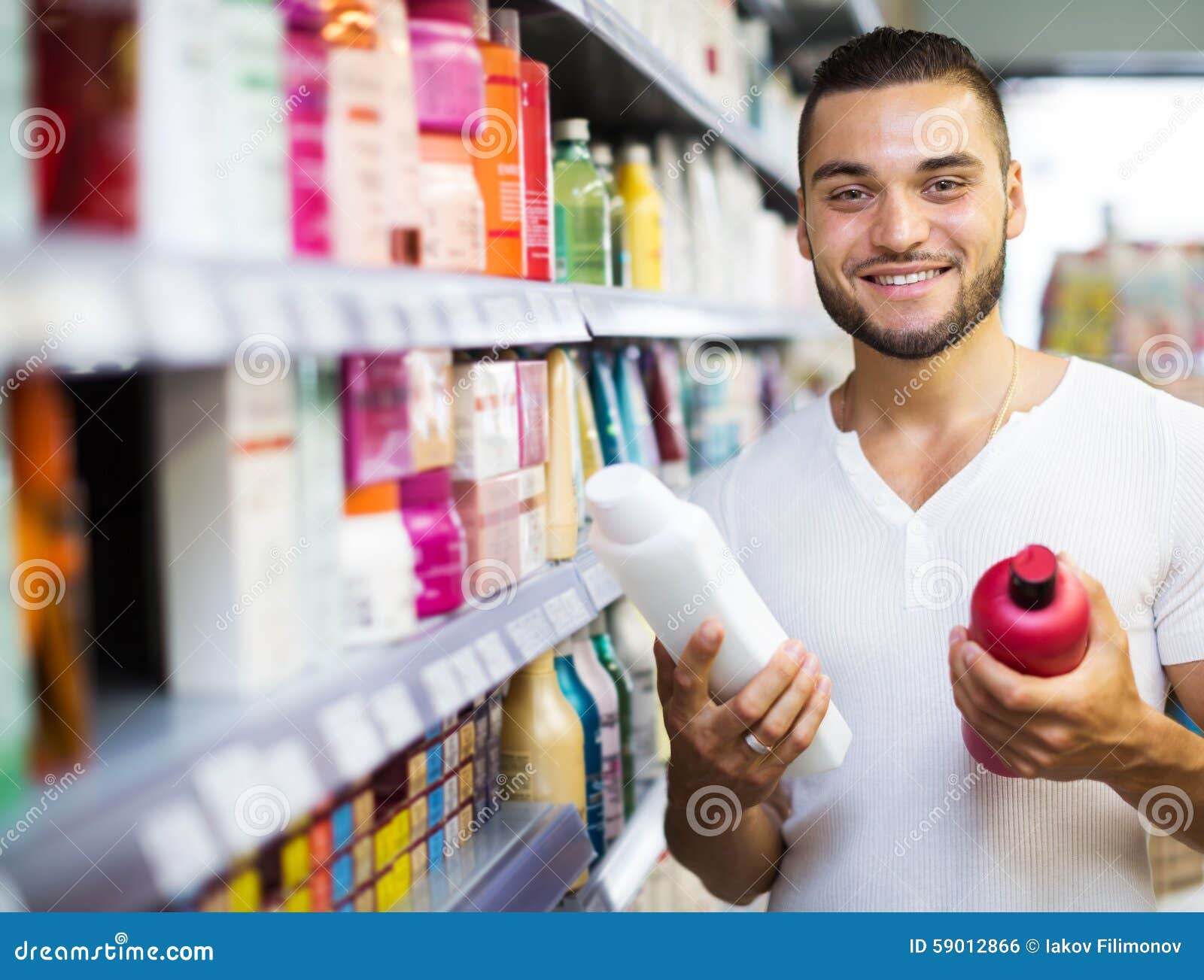 Man Chooses Shampoo in Store Stock Photo - Image of portrait, powder ...