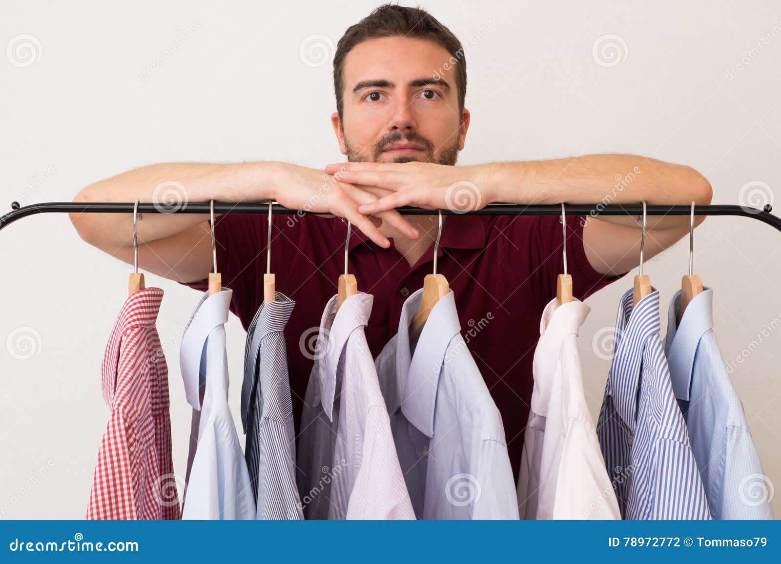 Man Choosing Shirts in Several Colors and Textures Stock Photo - Image ...