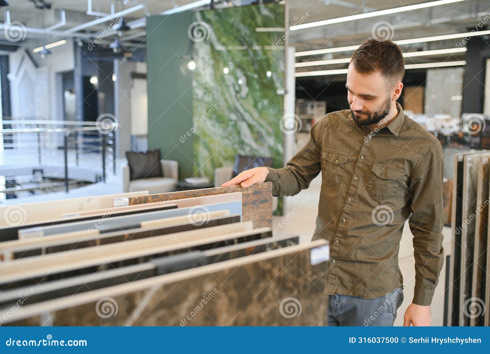 Man Choosing Tile among Different Samples in Store Stock Photo - Image ...