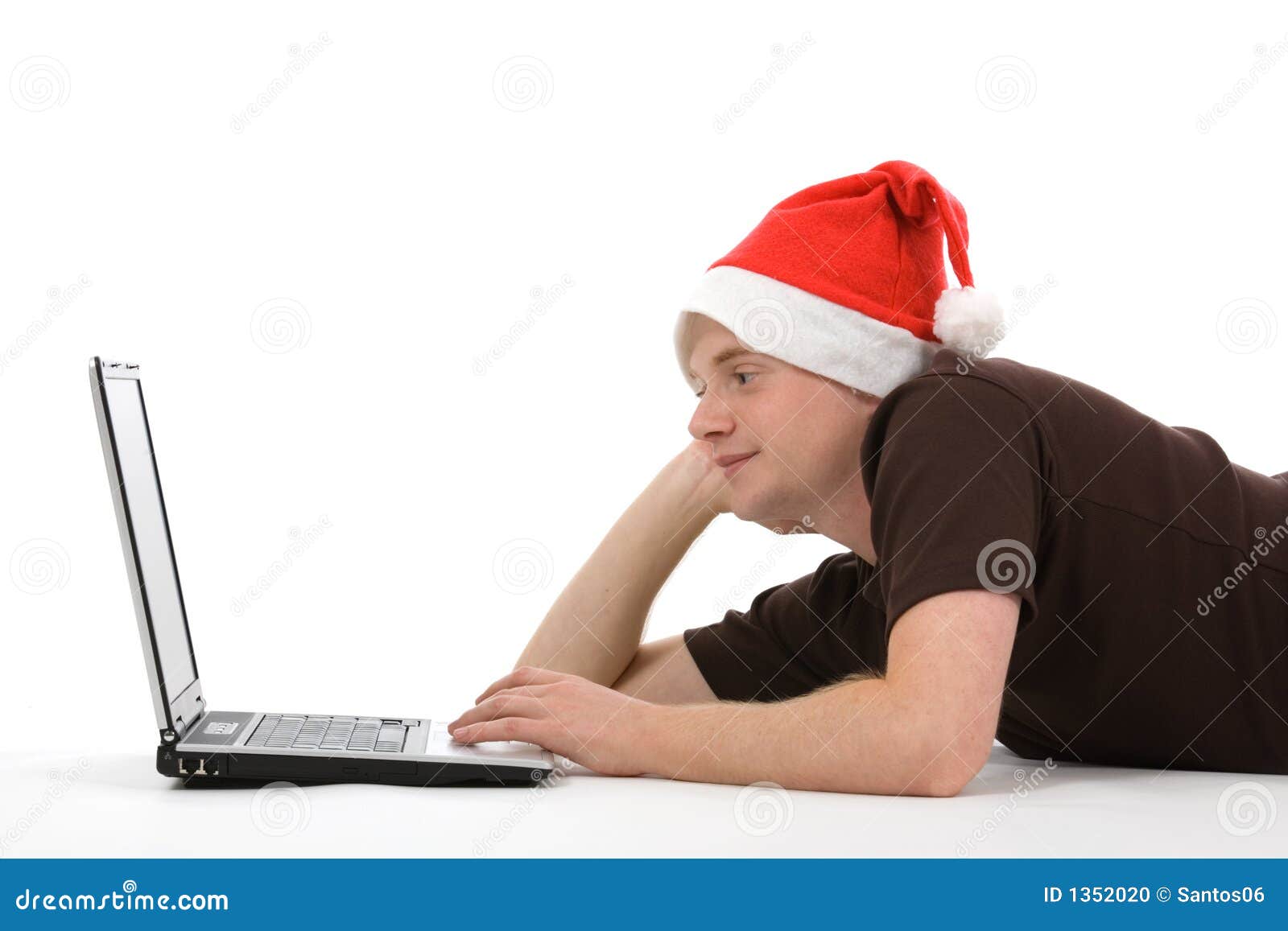 Man with Christmas Hat and Laptop Stock Photo - Image of package ...