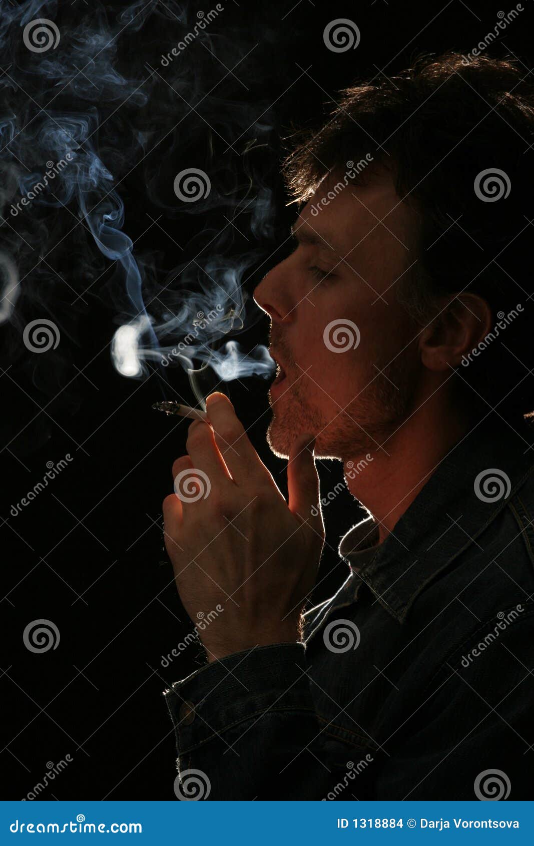 Man with cigarette stock photo. Image of masculine, held - 1318884