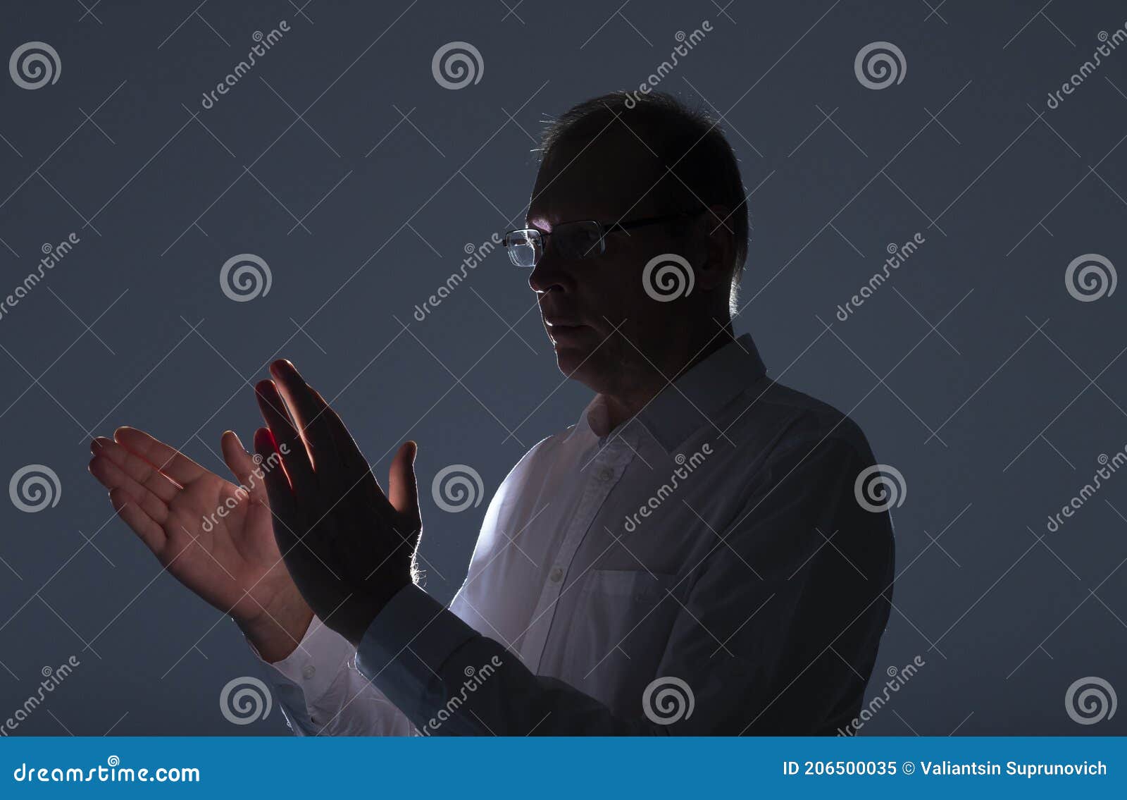 Man Clapping Hands in White Shirt with Backlit. Male Hands Apllauding ...