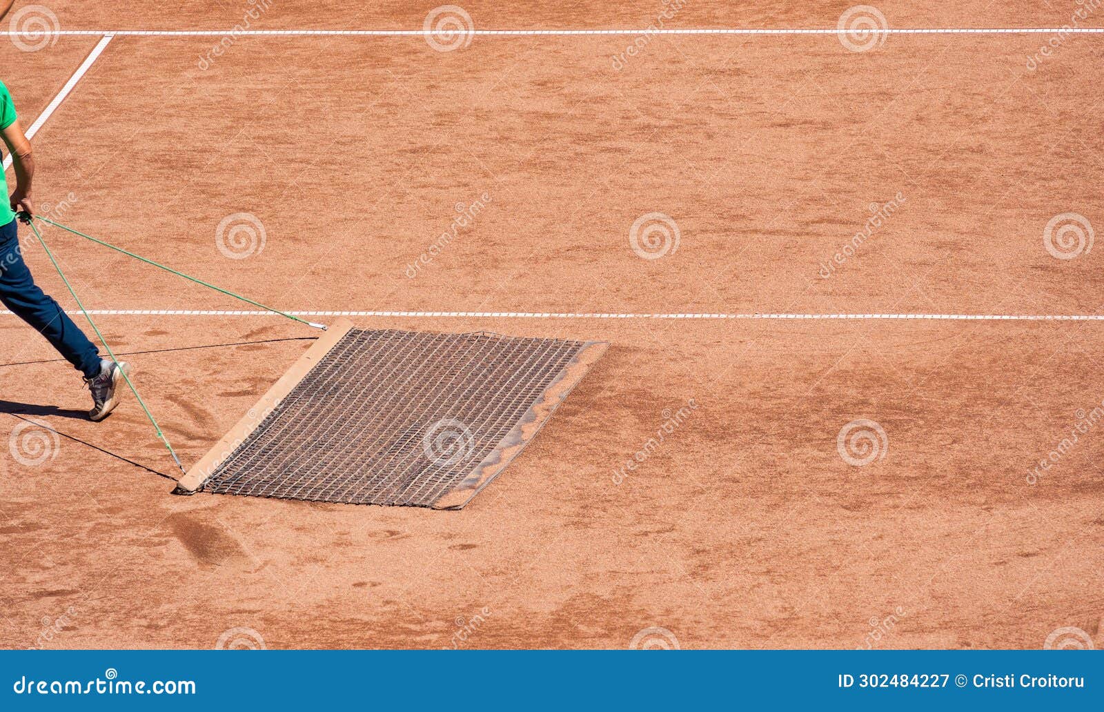 A Man Clean Sweeping the Tennis Court Clay Surface Stock Image - Image ...