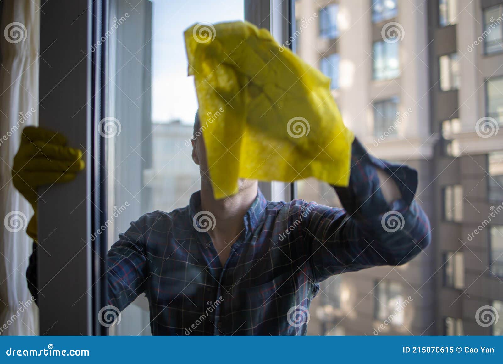 Man Cleaning Window at Home. a Worker Washes Windows in Office. Window ...