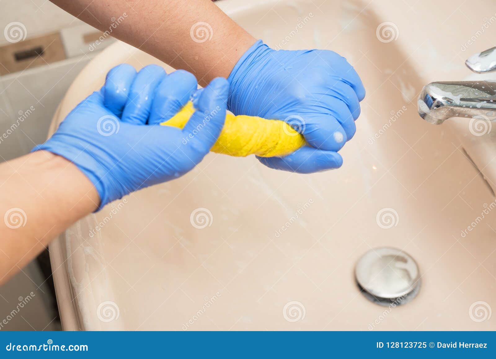 Man Cleaning Bathroom, Draining a Sponge Cloth Stock Image - Image of ...