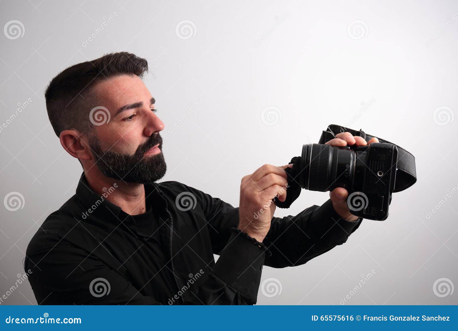 Man Cleaning the Camera Lens Stock Photo - Image of casual, ideas: 65575616
