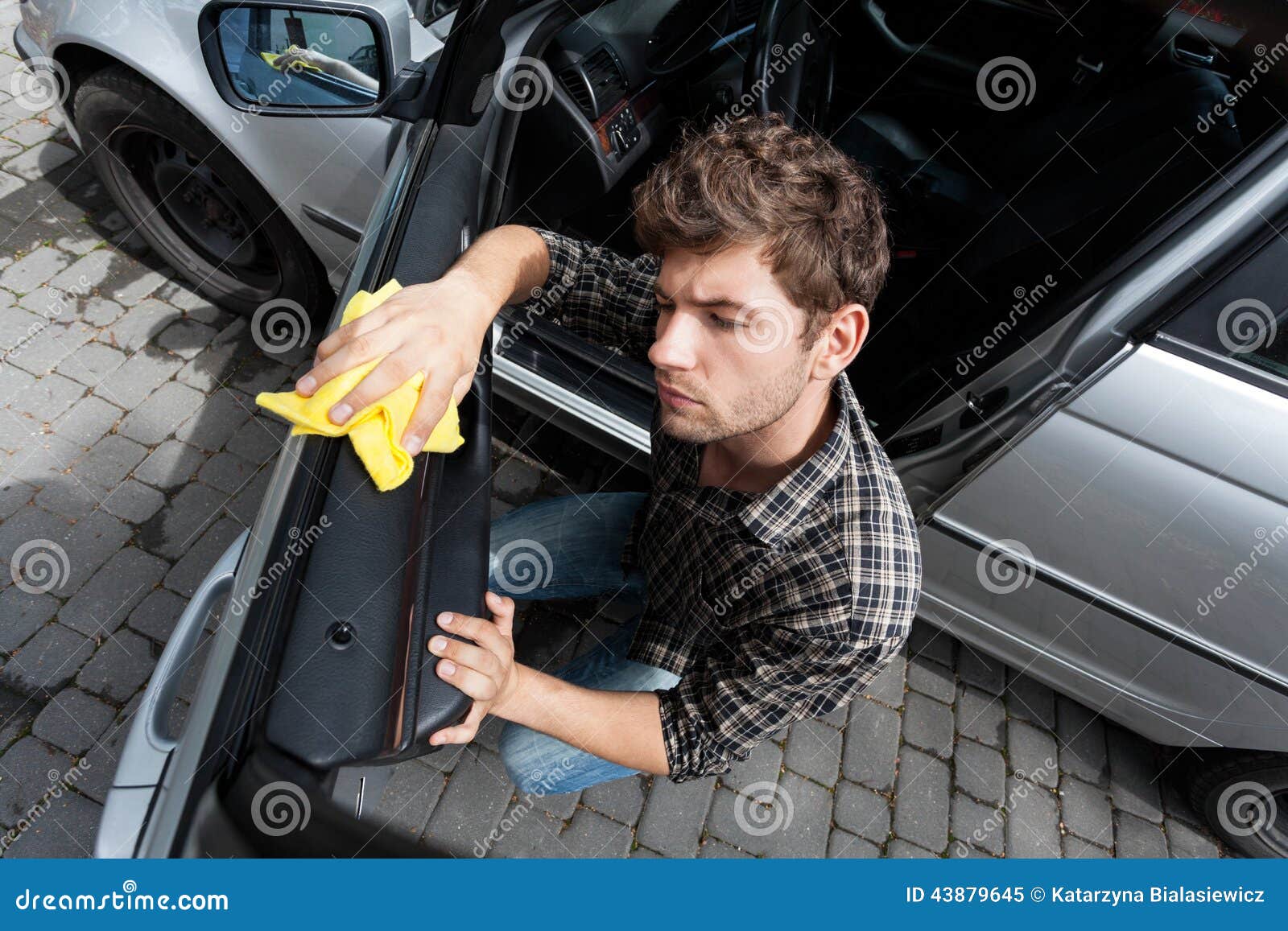 Man cleaning a car stock image. Image of husband, service - 43879645