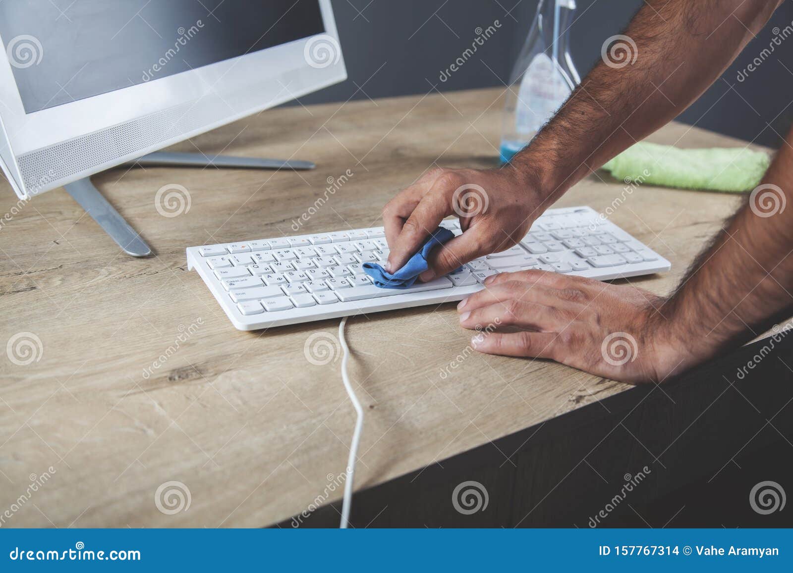 Man cleaning computer stock photo. Image of clean, technology - 157767314
