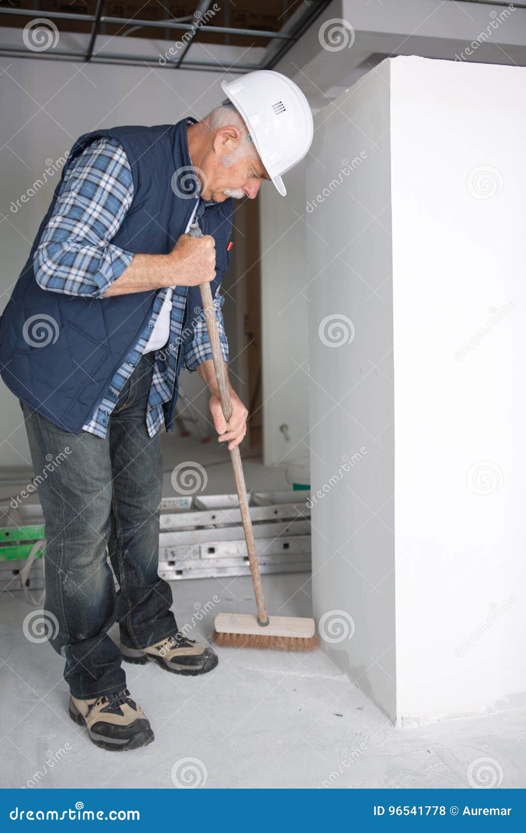 Man Cleaning Construction Site Stock Photo - Image of home, cleanup ...