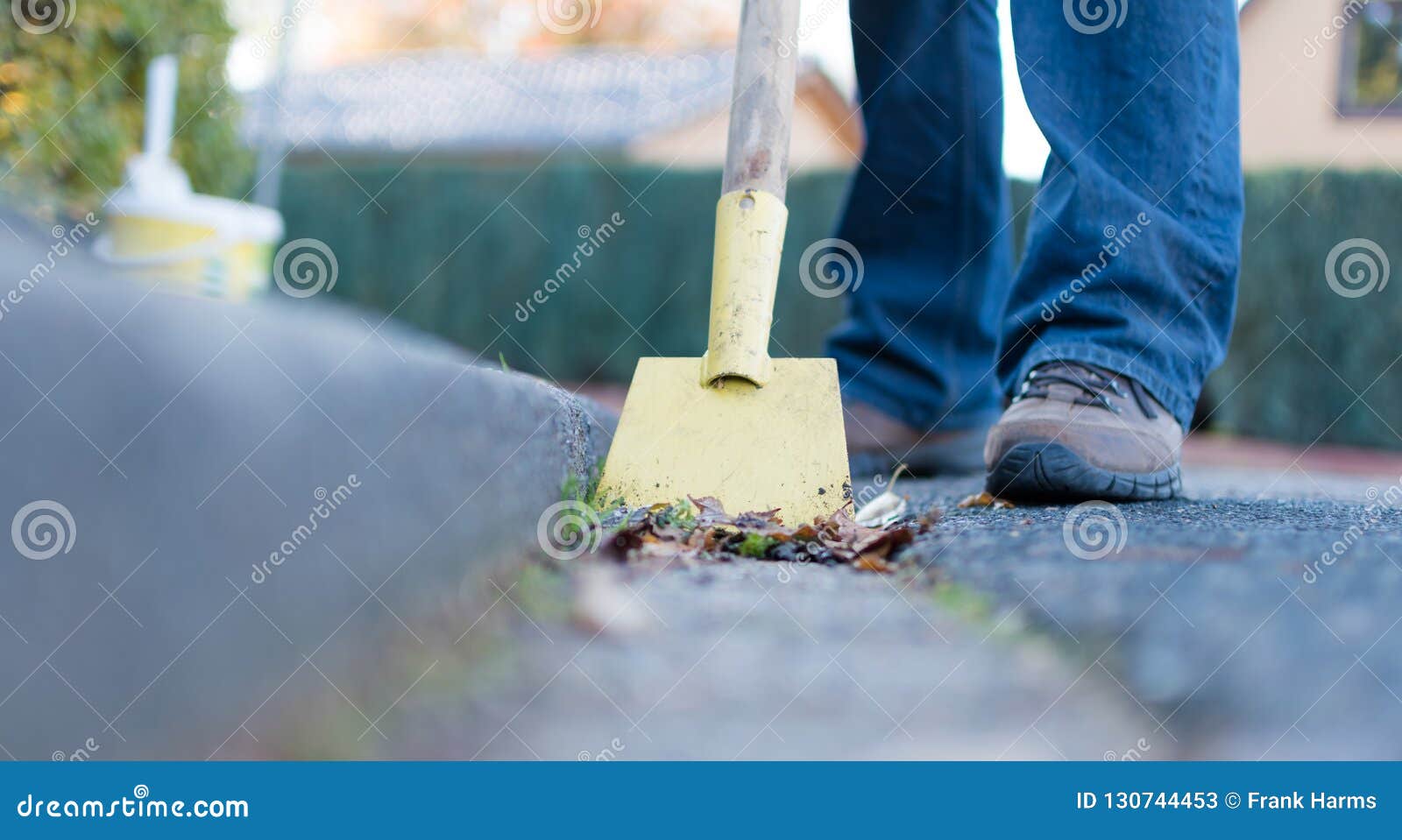 Man is cleaning the gutter stock image. Image of rain - 130744453