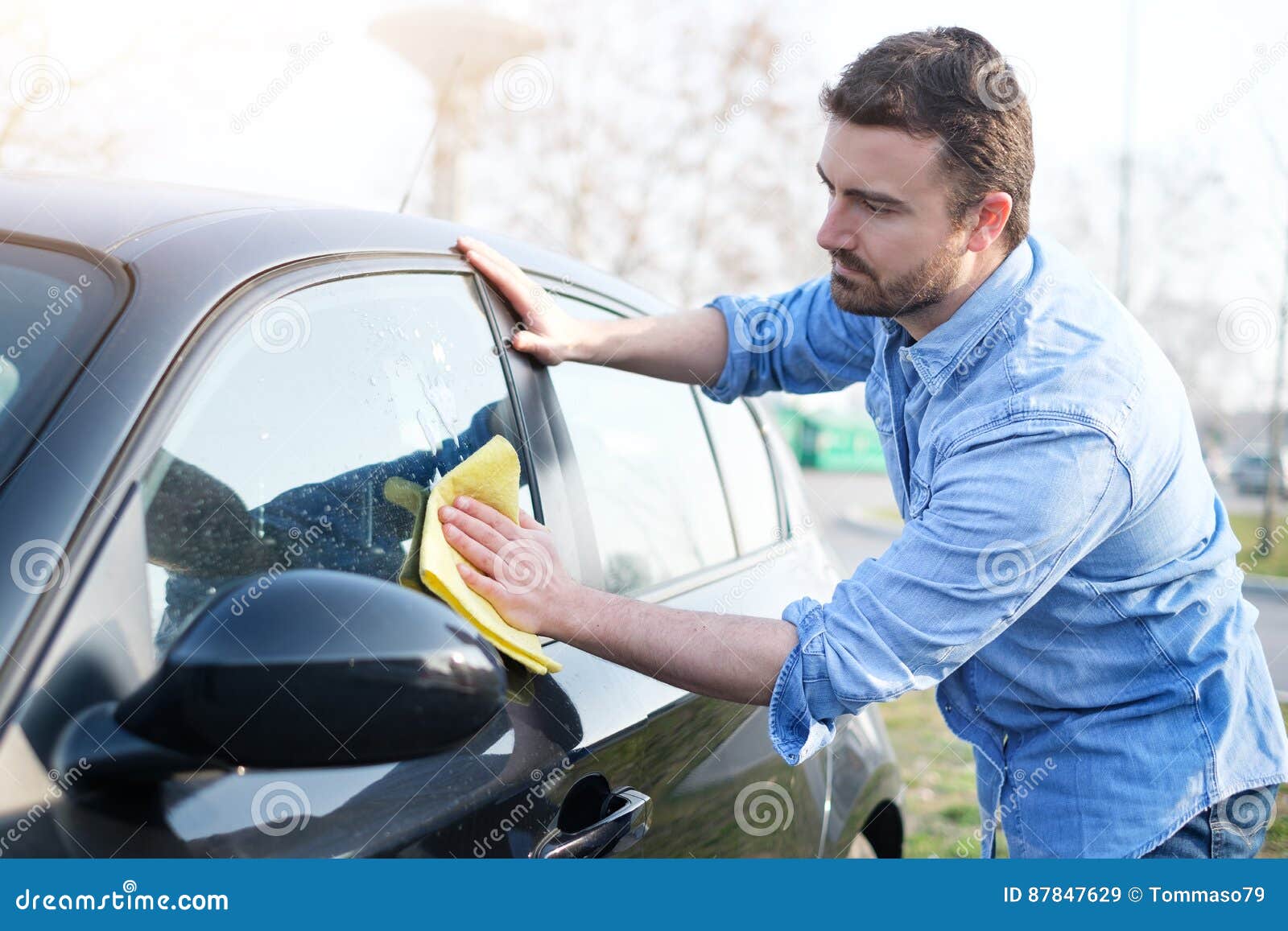 Man cleaning his car stock image. Image of gearshift - 87847629