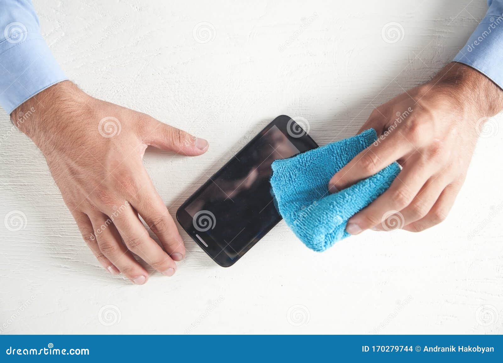 Man Cleaning His Smartphone in Office Stock Photo - Image of person ...