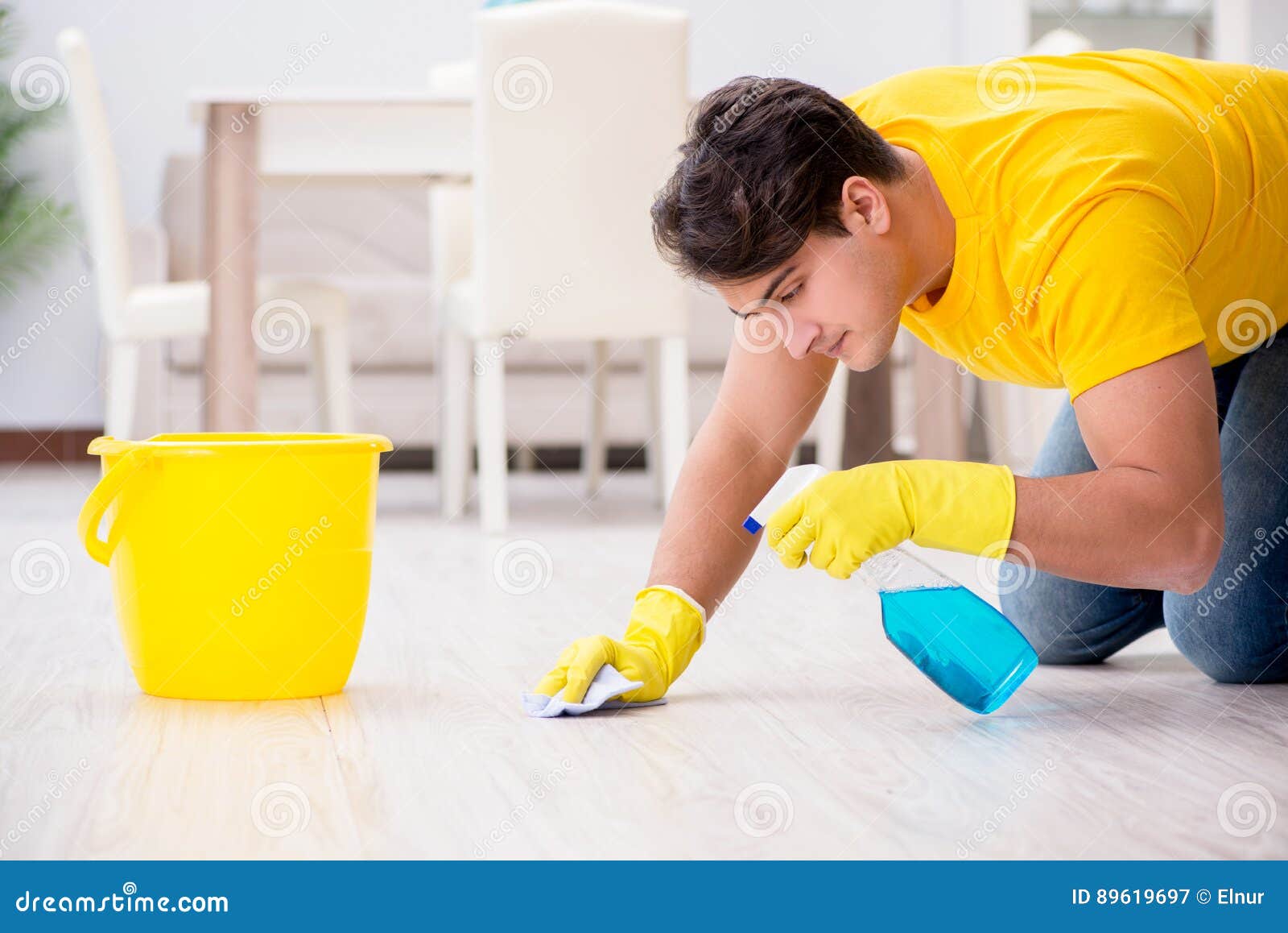 The Man Cleaning the House Helping His Wife Stock Image - Image of ...