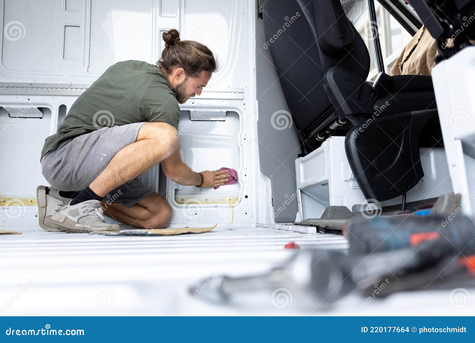 Man Cleaning the Inside of a Van Stock Photo - Image of person ...