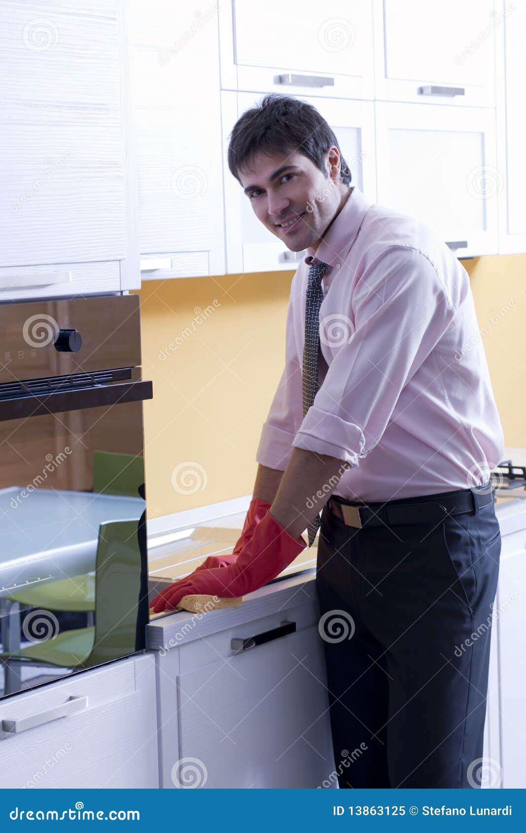 Man Cleaning Kitchen Counter Stock Image - Image of counter, kitchen ...