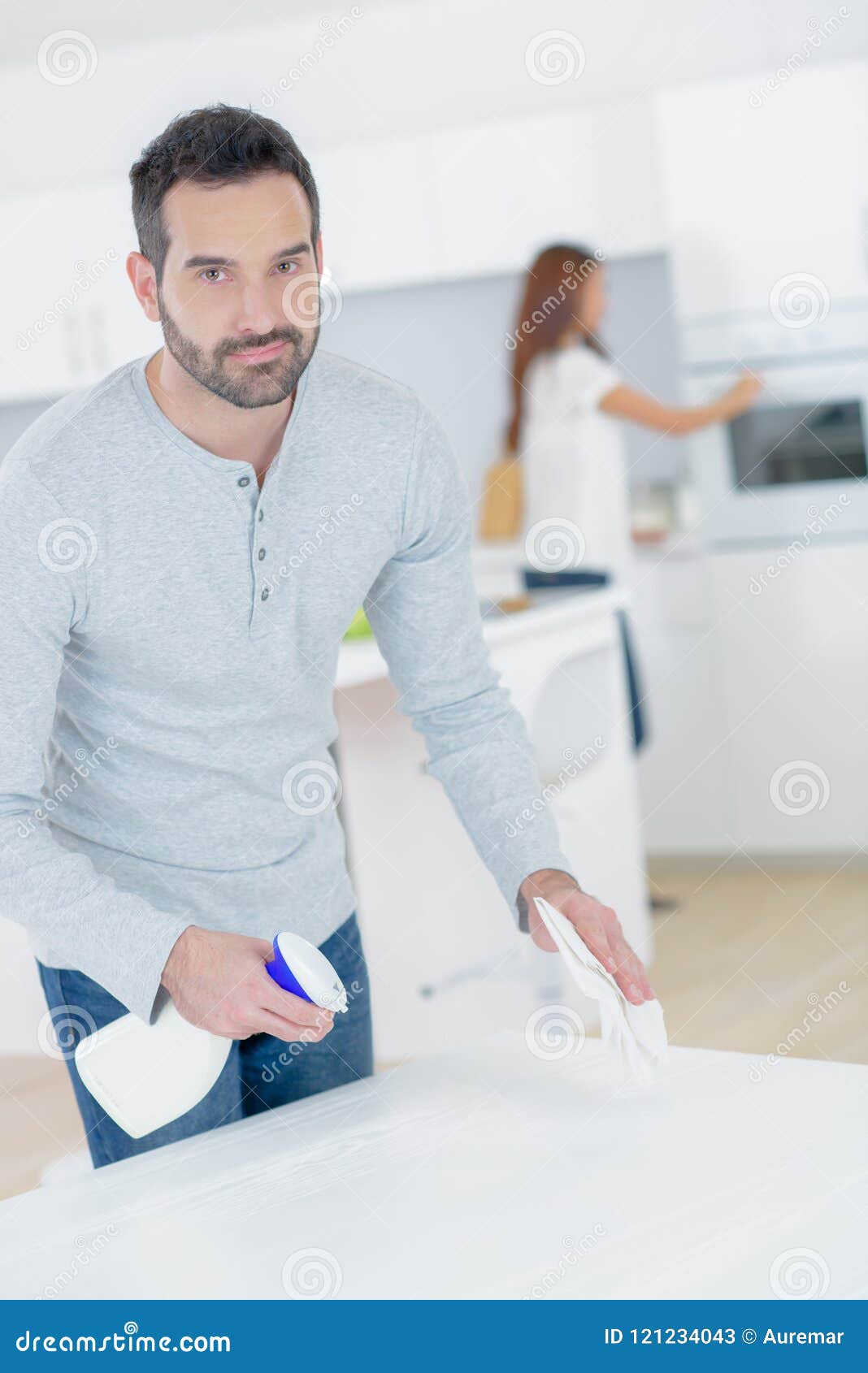 Man Cleaning Kitchen Table with Spray Stock Image - Image of dirt ...