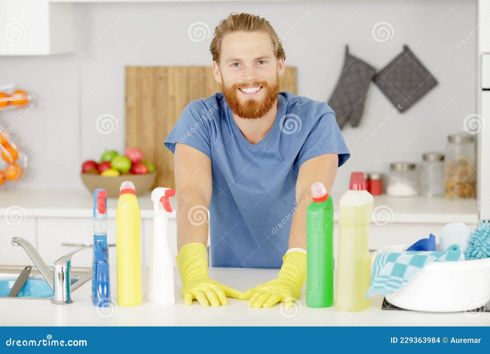 Man Cleaning Kitchen Worktop Stock Photo - Image of spray, appartment ...