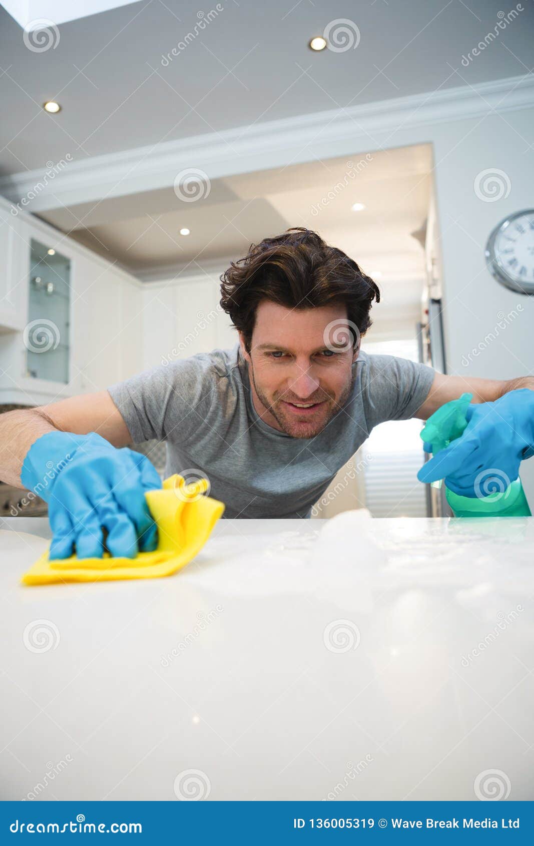 Man Cleaning Kitchen Worktop at Home Stock Image - Image of life ...