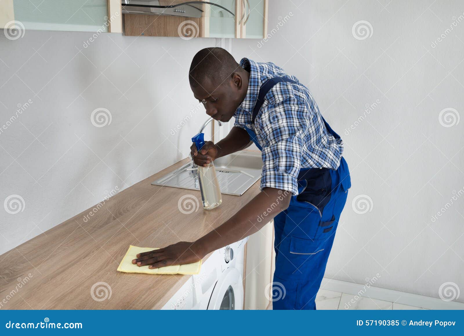 Man Cleaning Kitchen Worktop Stock Image - Image of manual, chores ...