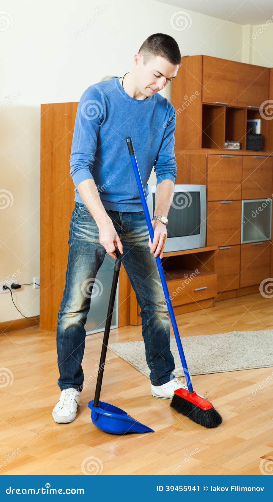 Man Cleaning in Living Room Stock Image - Image of sweeping, interior ...
