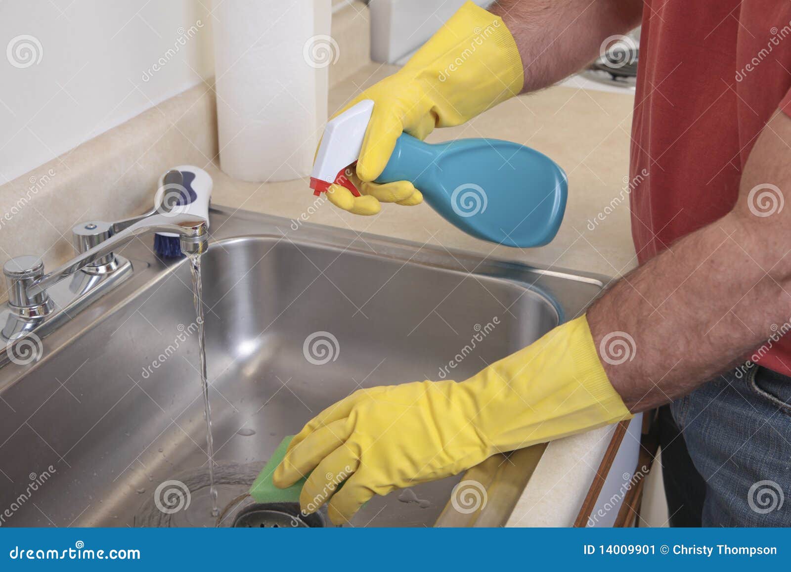 Man cleaning the sink stock image. Image of squirt, faucet - 14009901