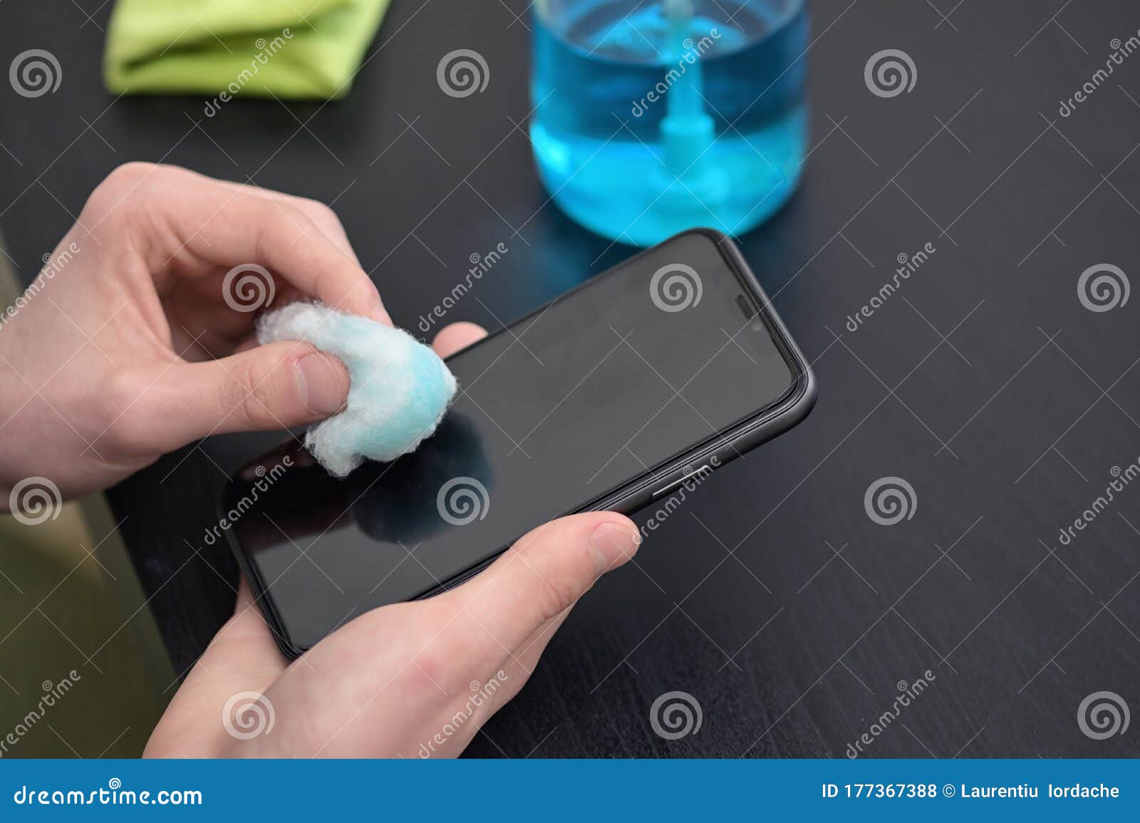 Man Cleaning Smartphone Screen with Alcohol Stock Photo - Image of ...