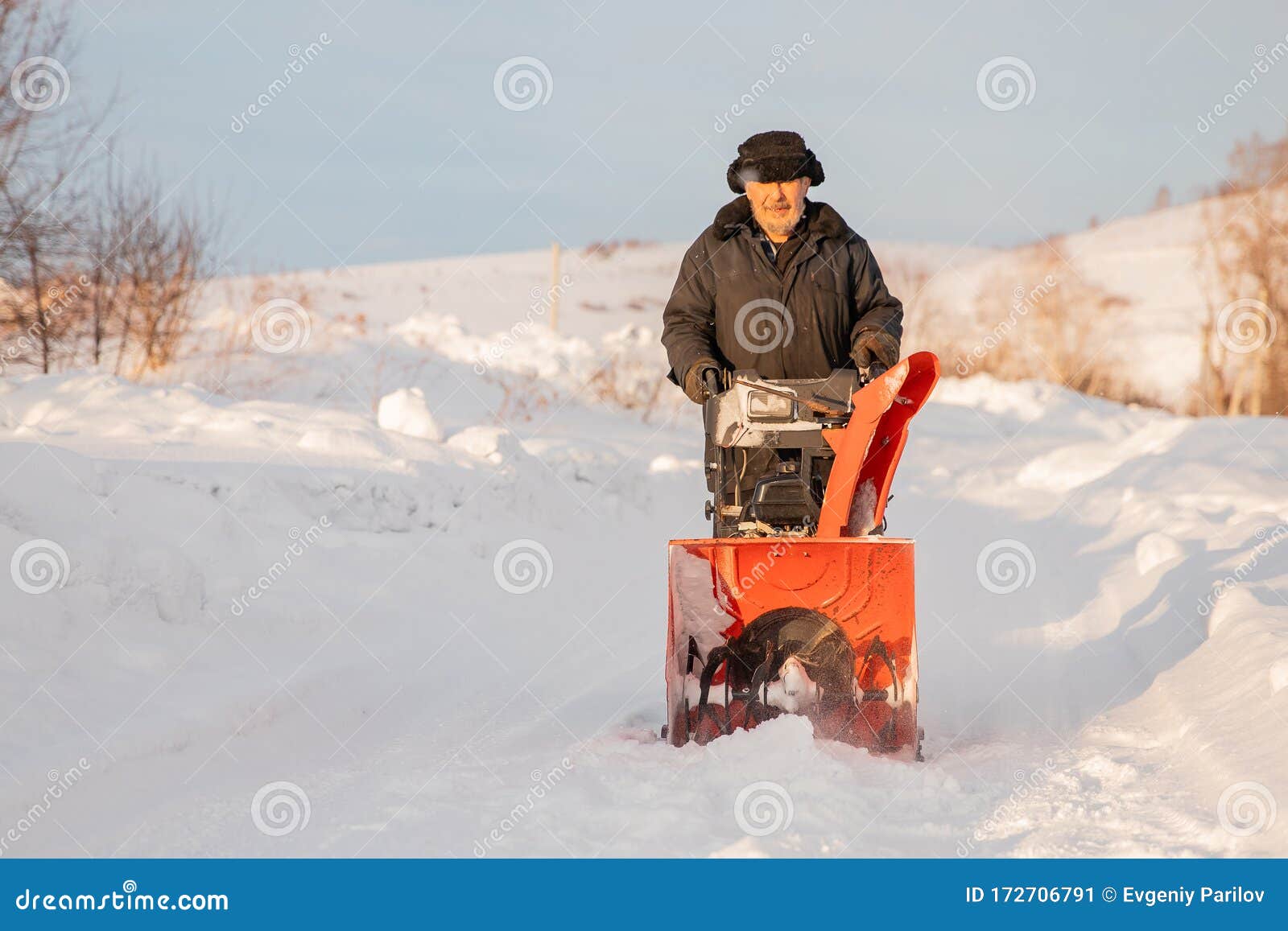 Man Cleaning Snow from Sidewalks with Snowblower Machine Winter Stock ...