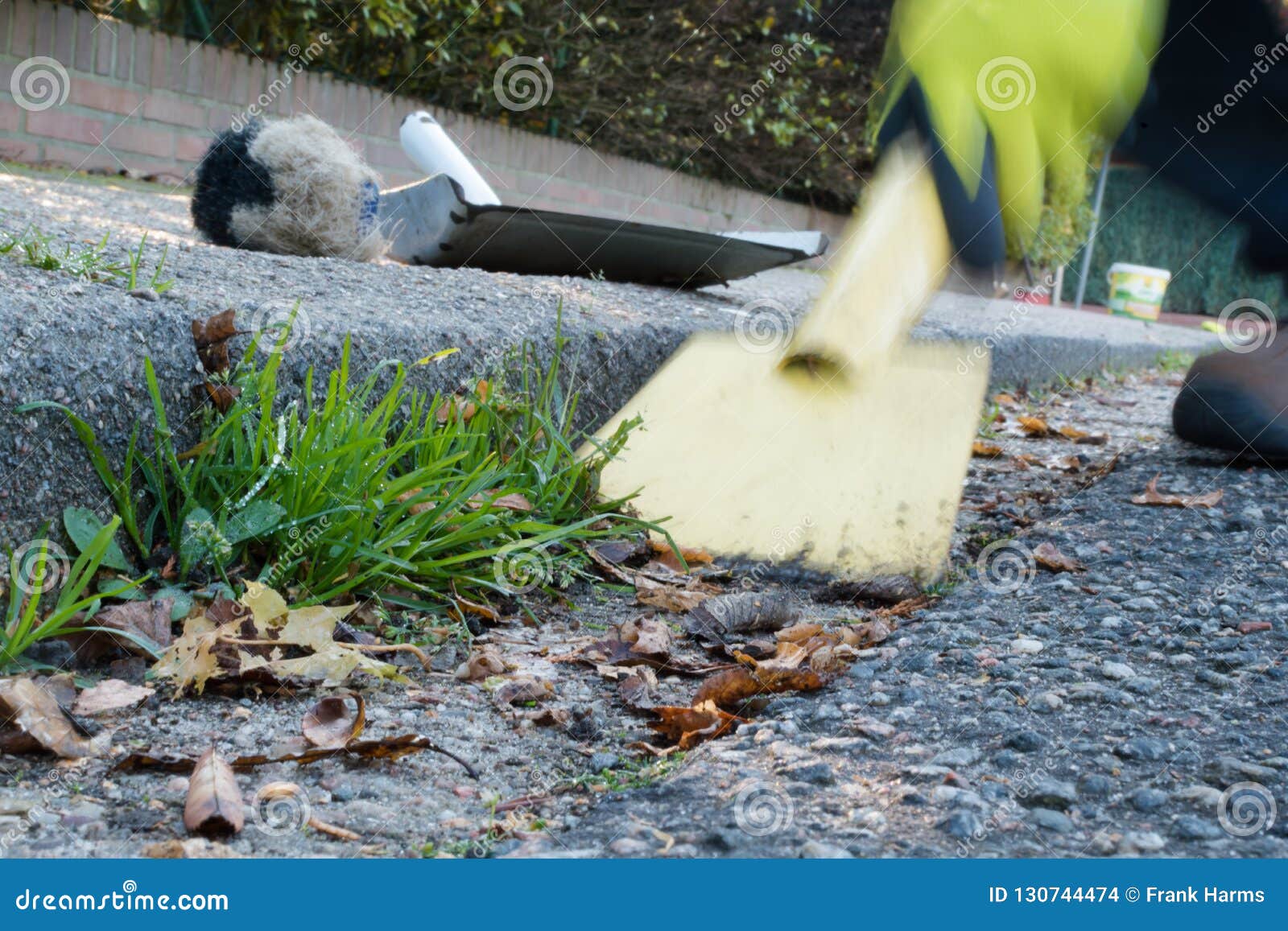 Man is cleaning the gutter stock photo. Image of gutters - 130744474